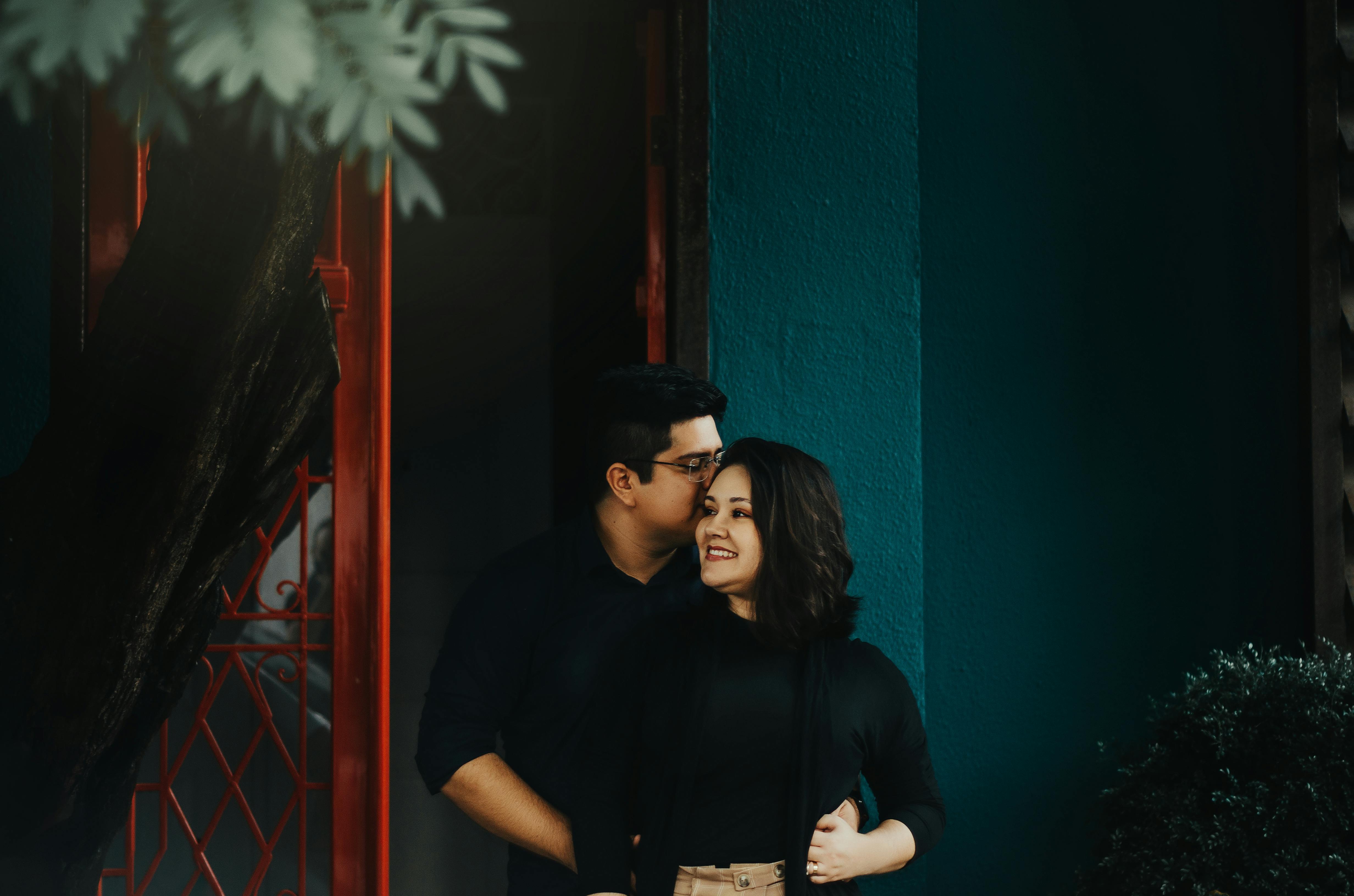 A Man Carrying His Partner · Free Stock Photo