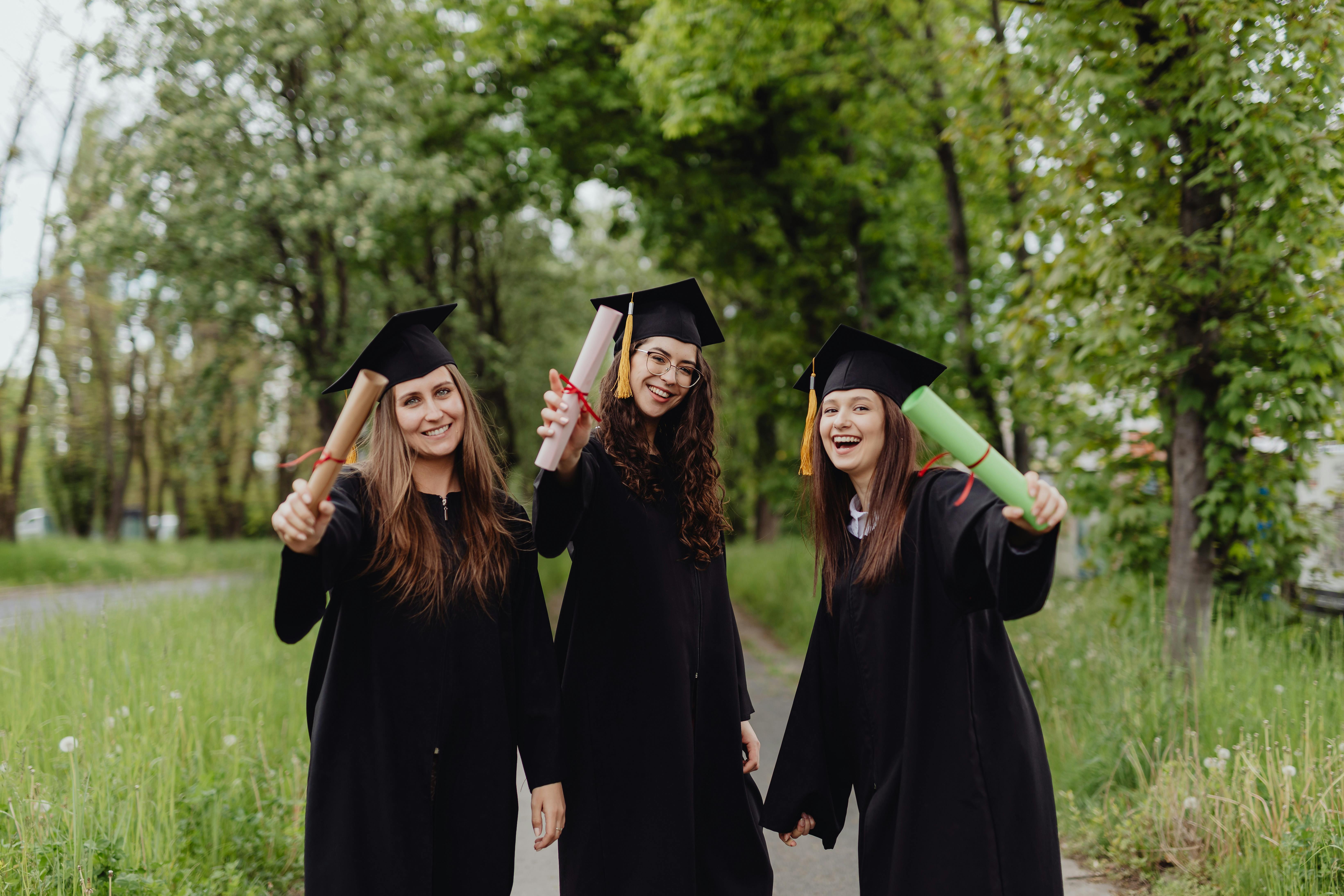 Young Girls Celebrating Their Graduation · Free Stock Photo