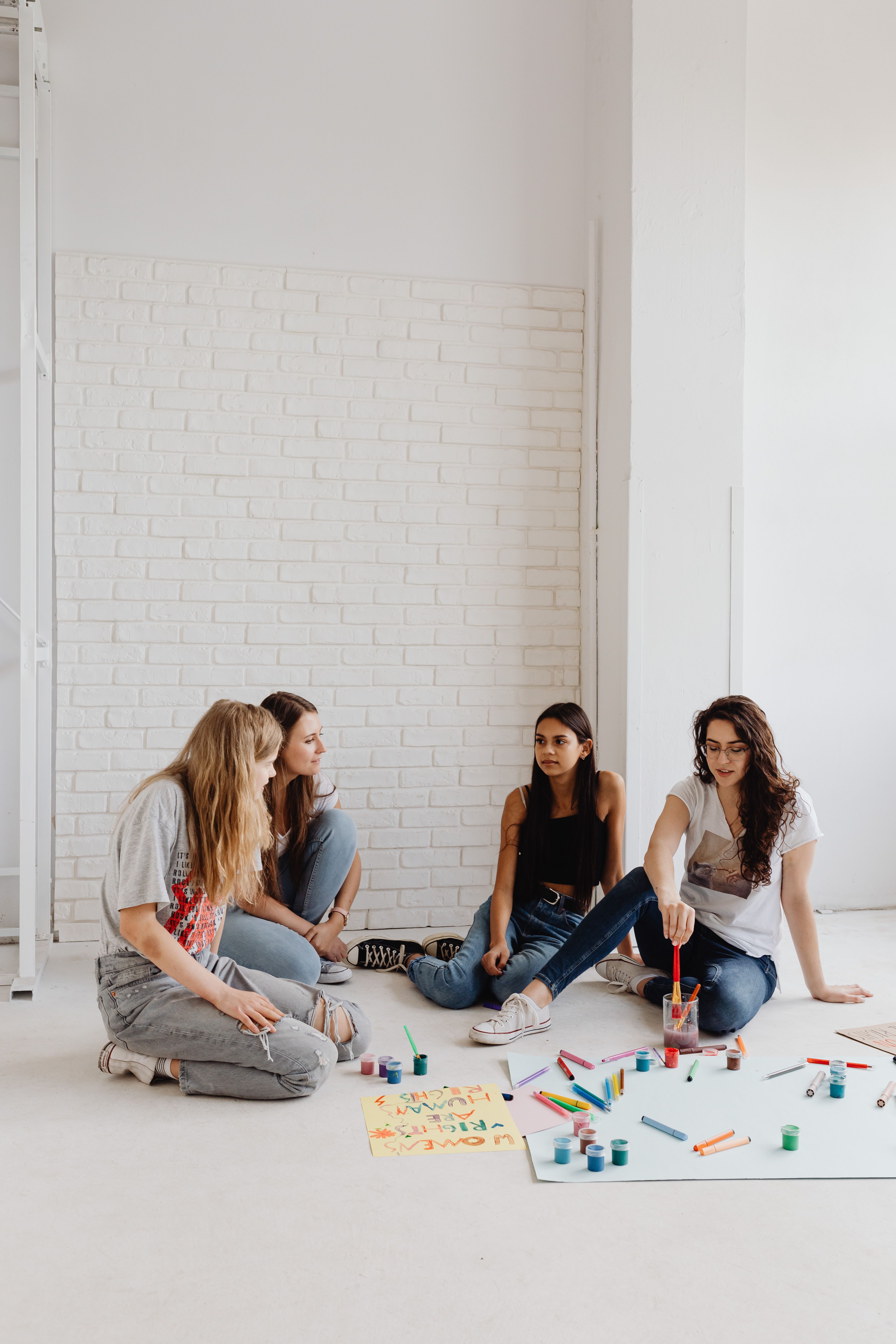 Women Sitting on Floor · Free Stock Photo