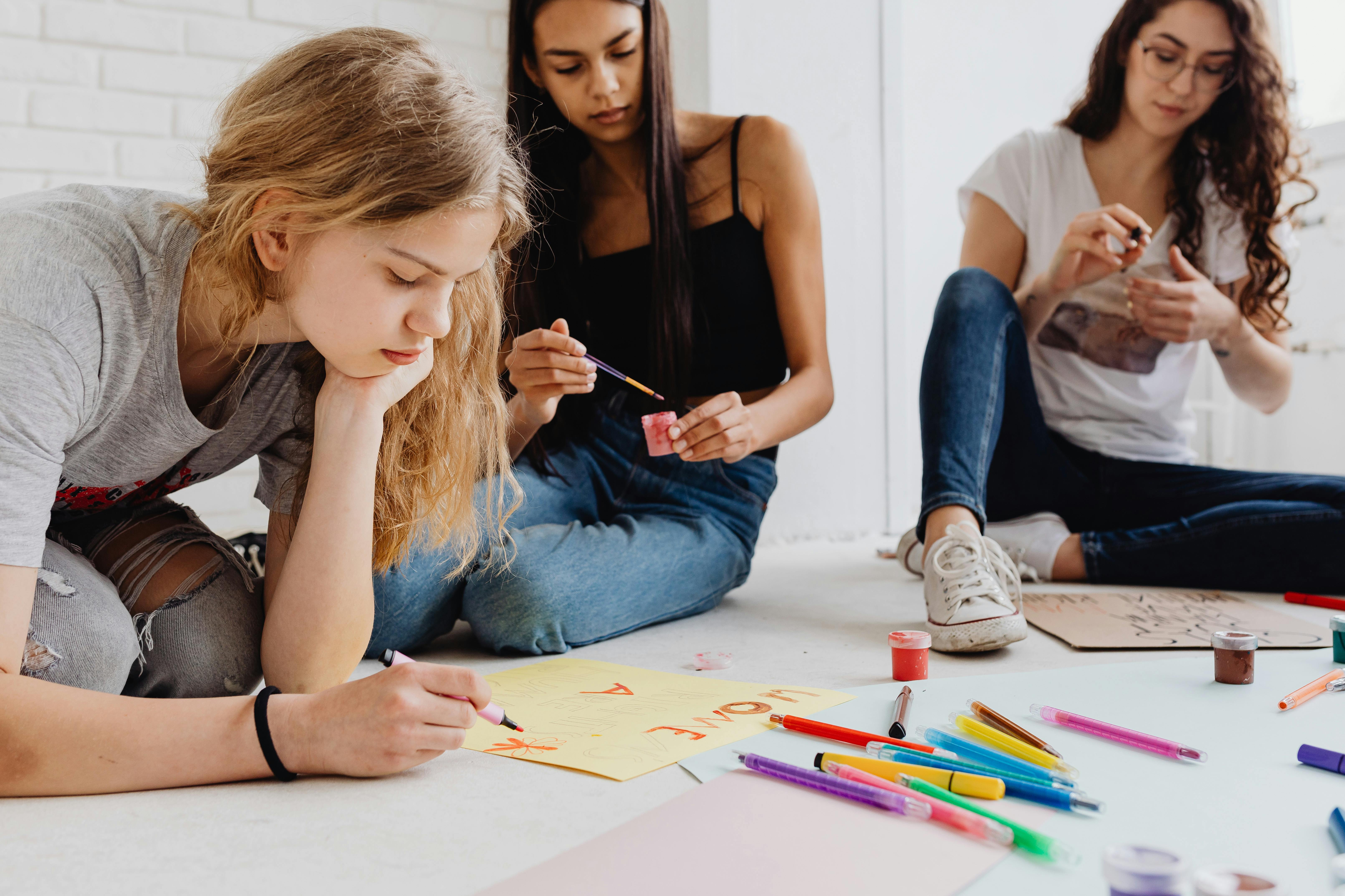 Women Making Protest Posters Indoors · Free Stock Photo