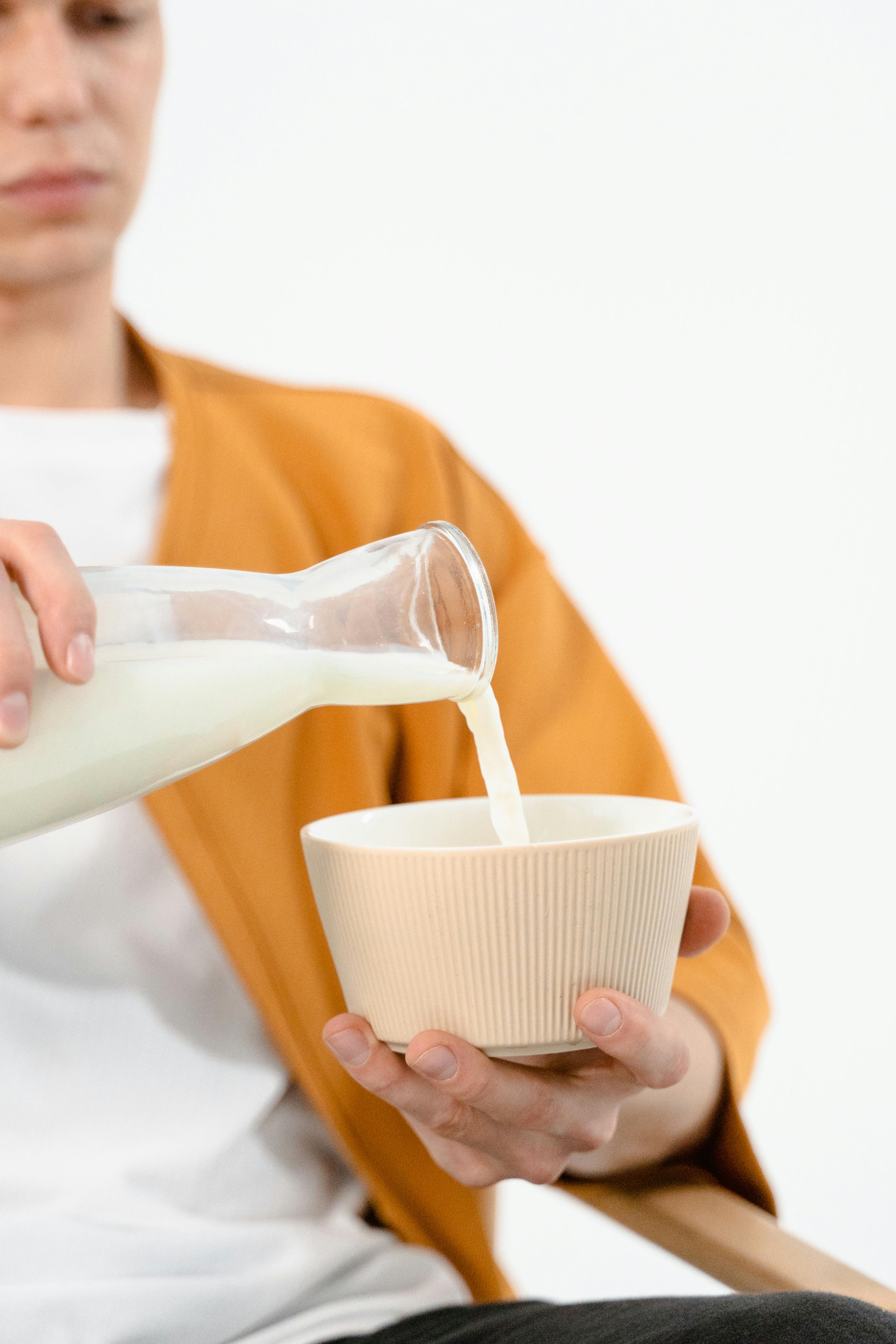 A Bowl Collecting Rubber Milk · Free Stock Photo