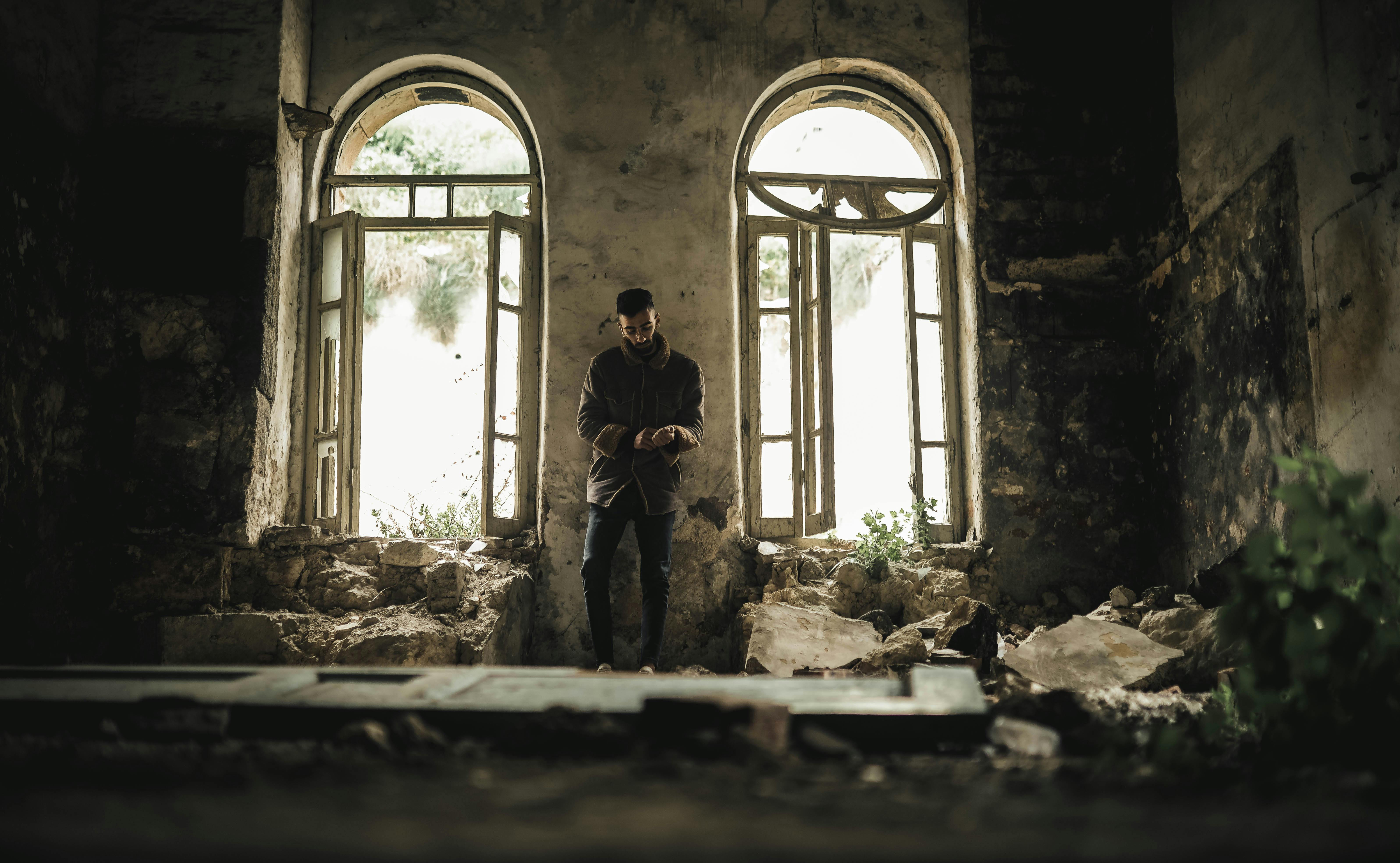 Man in Building Ruins · Free Stock Photo