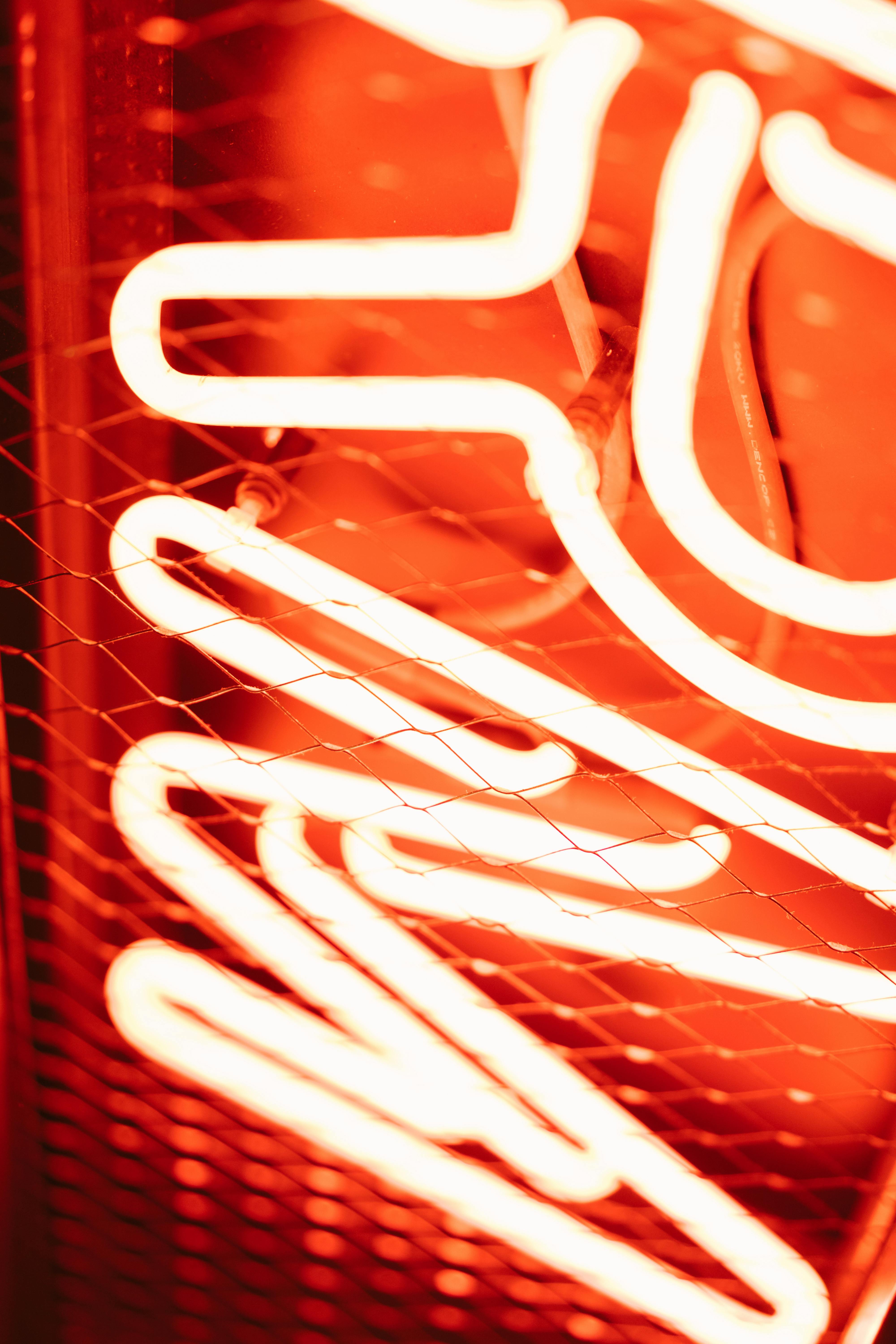 Close Up Shot of a Red Neon Signage · Free Stock Photo
