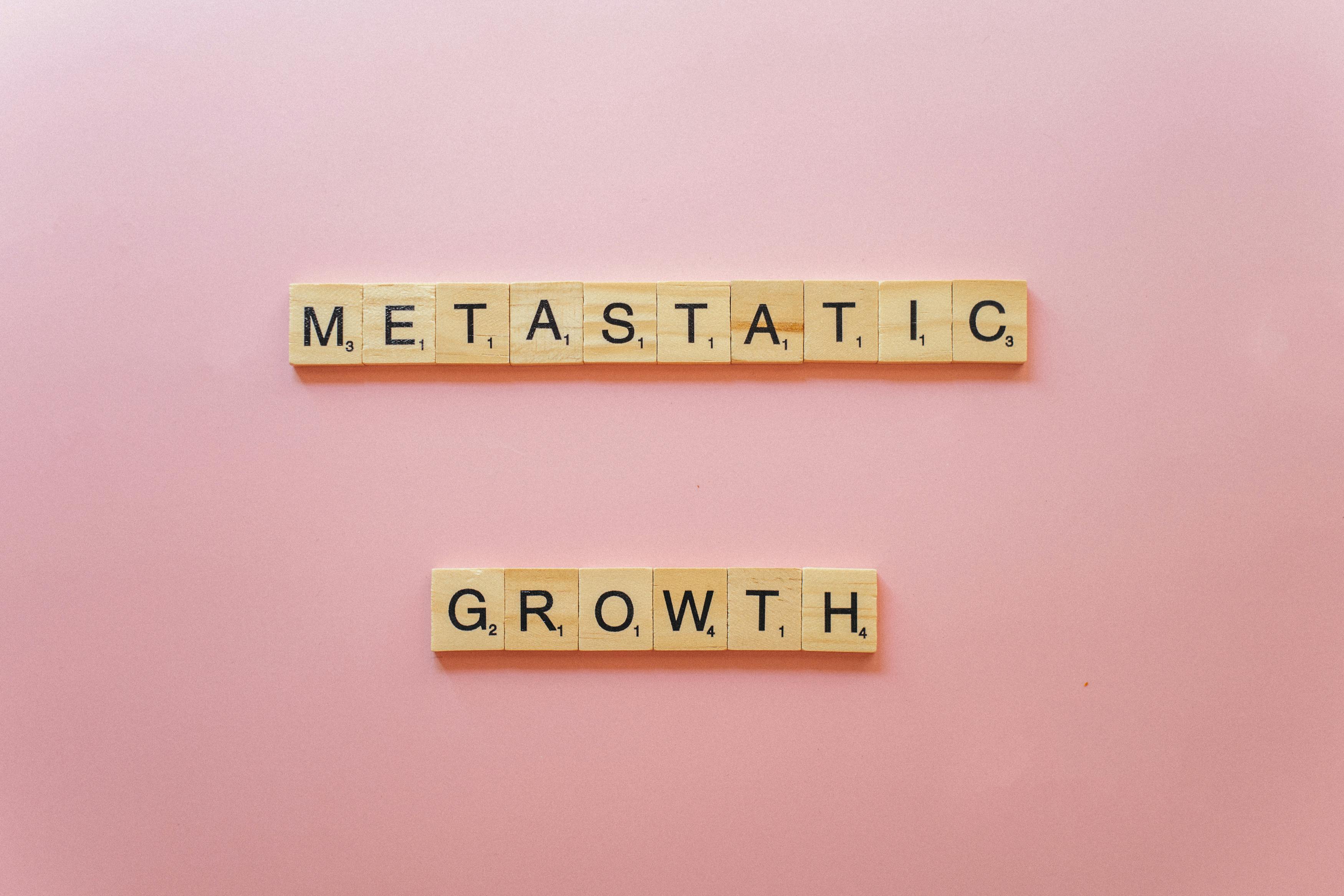 Brown Wooden Scrabble Tiles on White Surface · Free Stock Photo