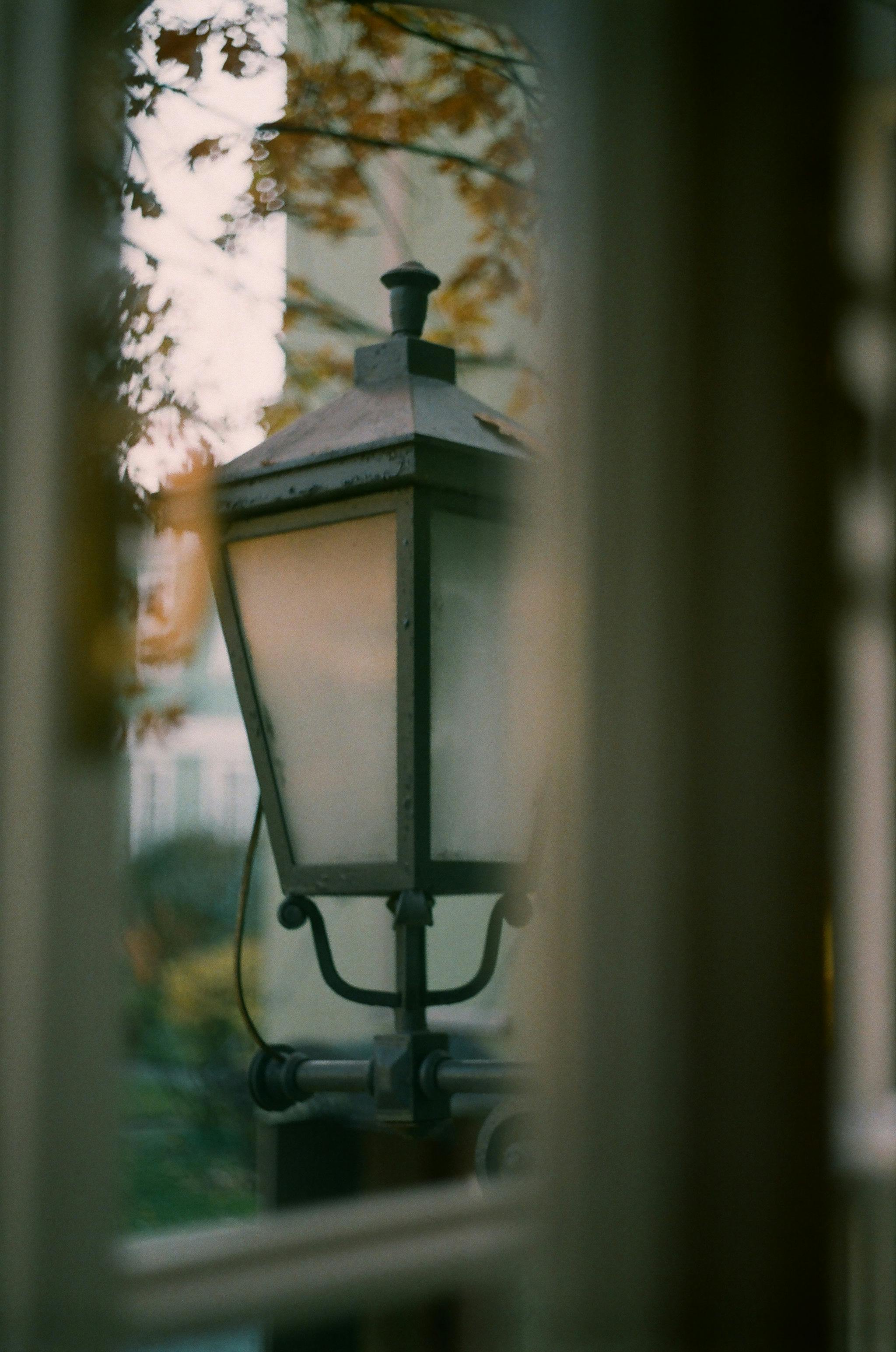 Close-up of Street Lamp near Window · Free Stock Photo