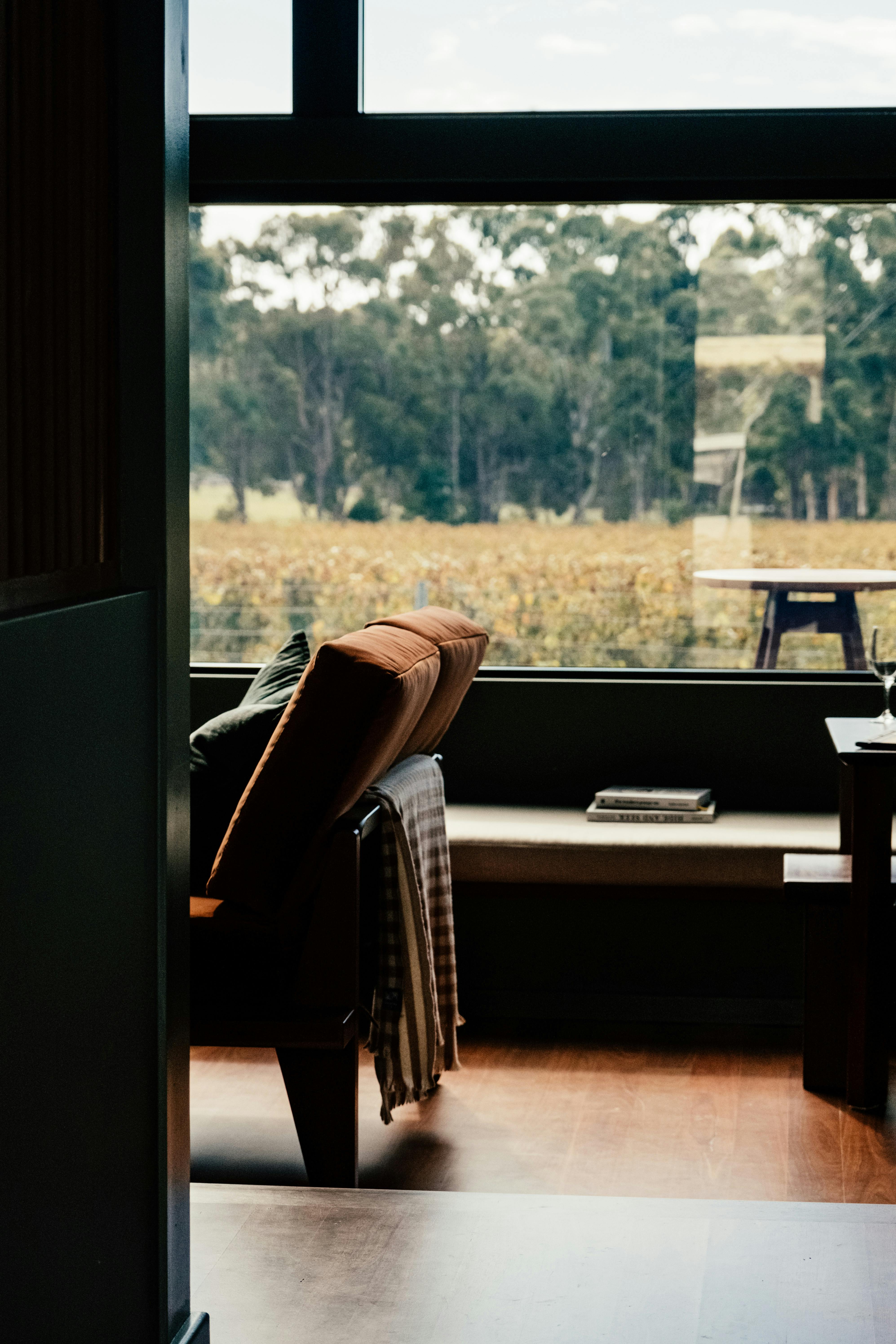 Living Room Overlooking a Field Through a Window · Free Stock Photo