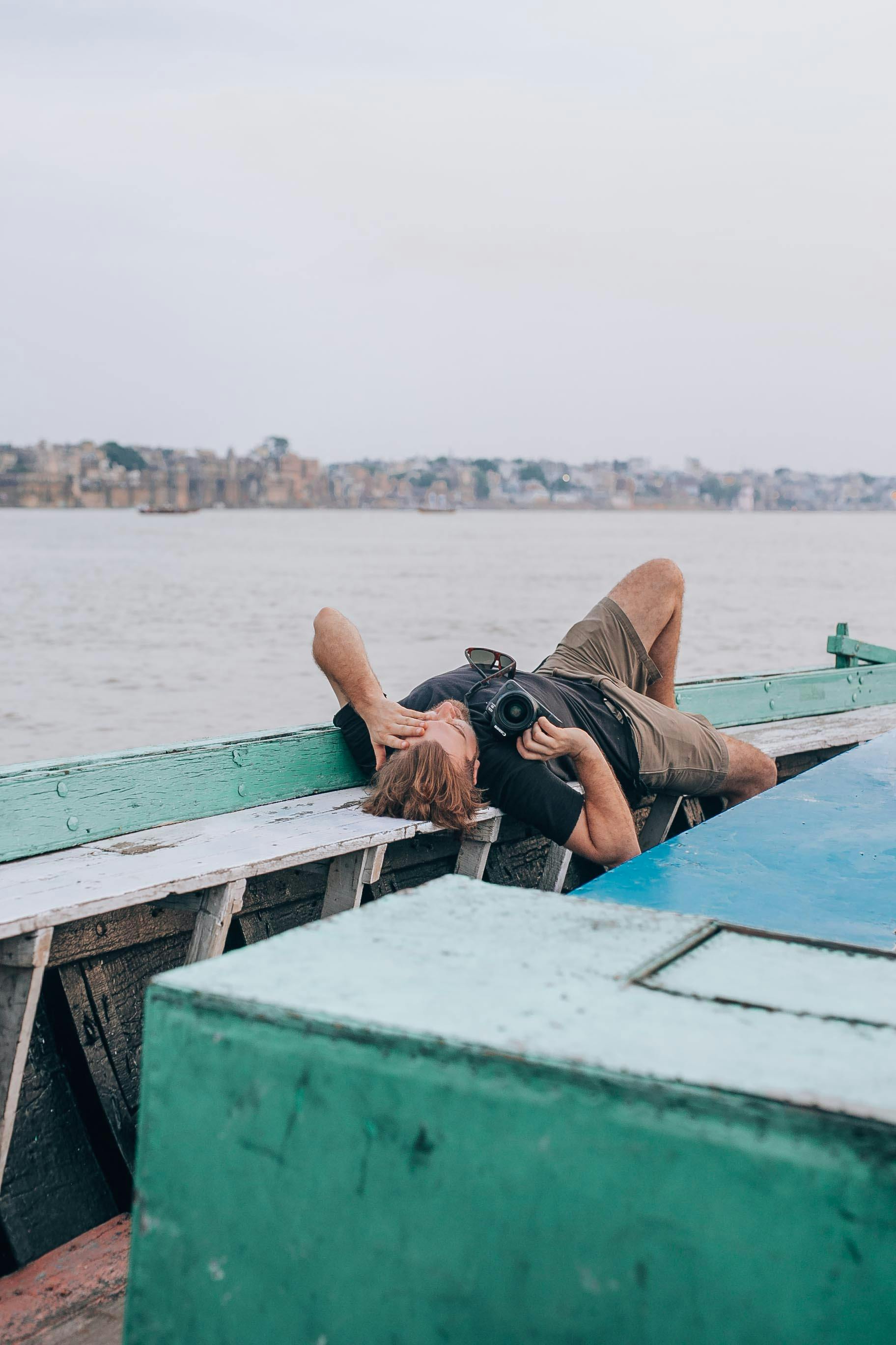 Photographer Relaxing on Boat · Free Stock Photo