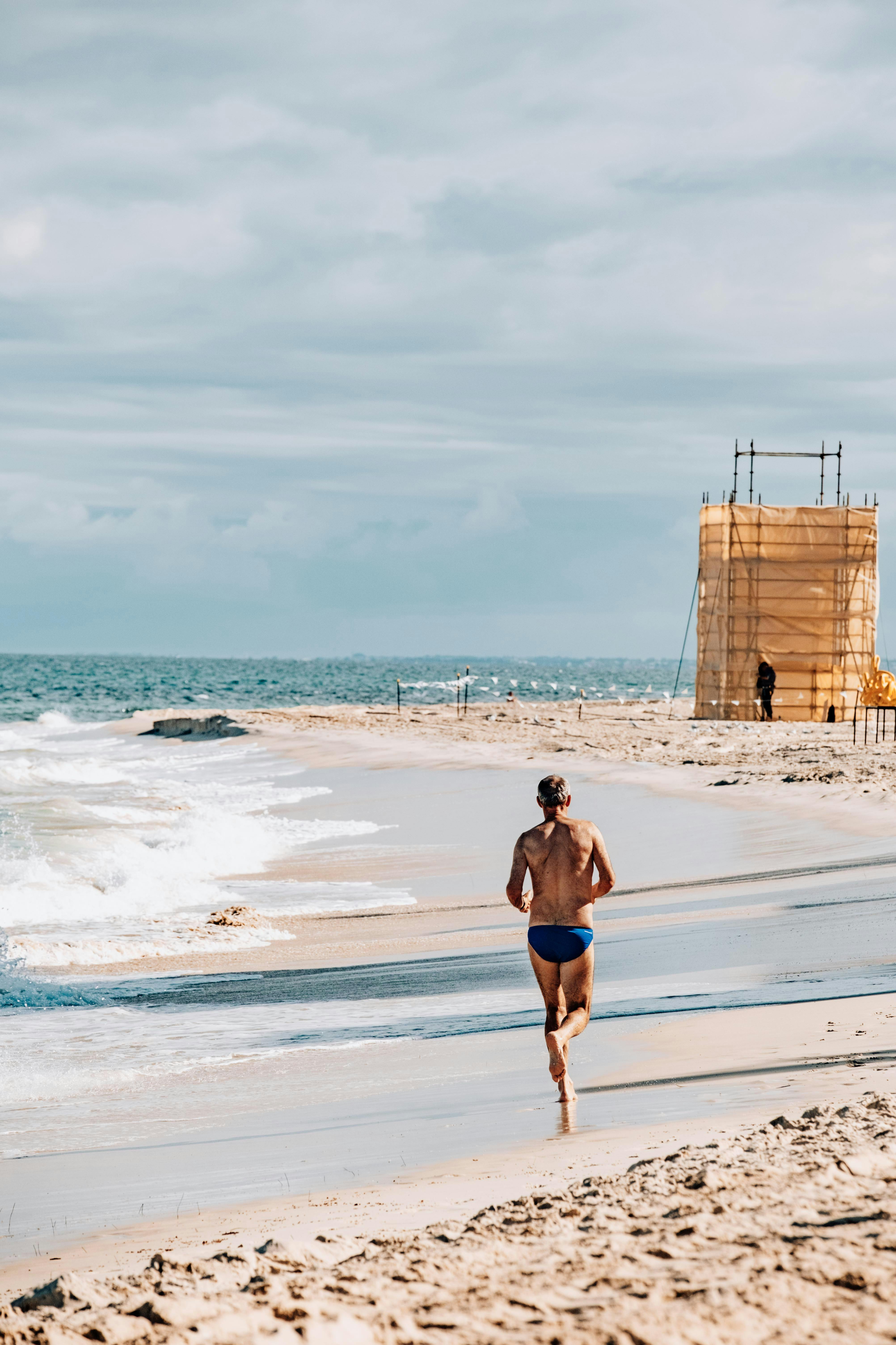 Man Running on Beach · Free Stock Photo