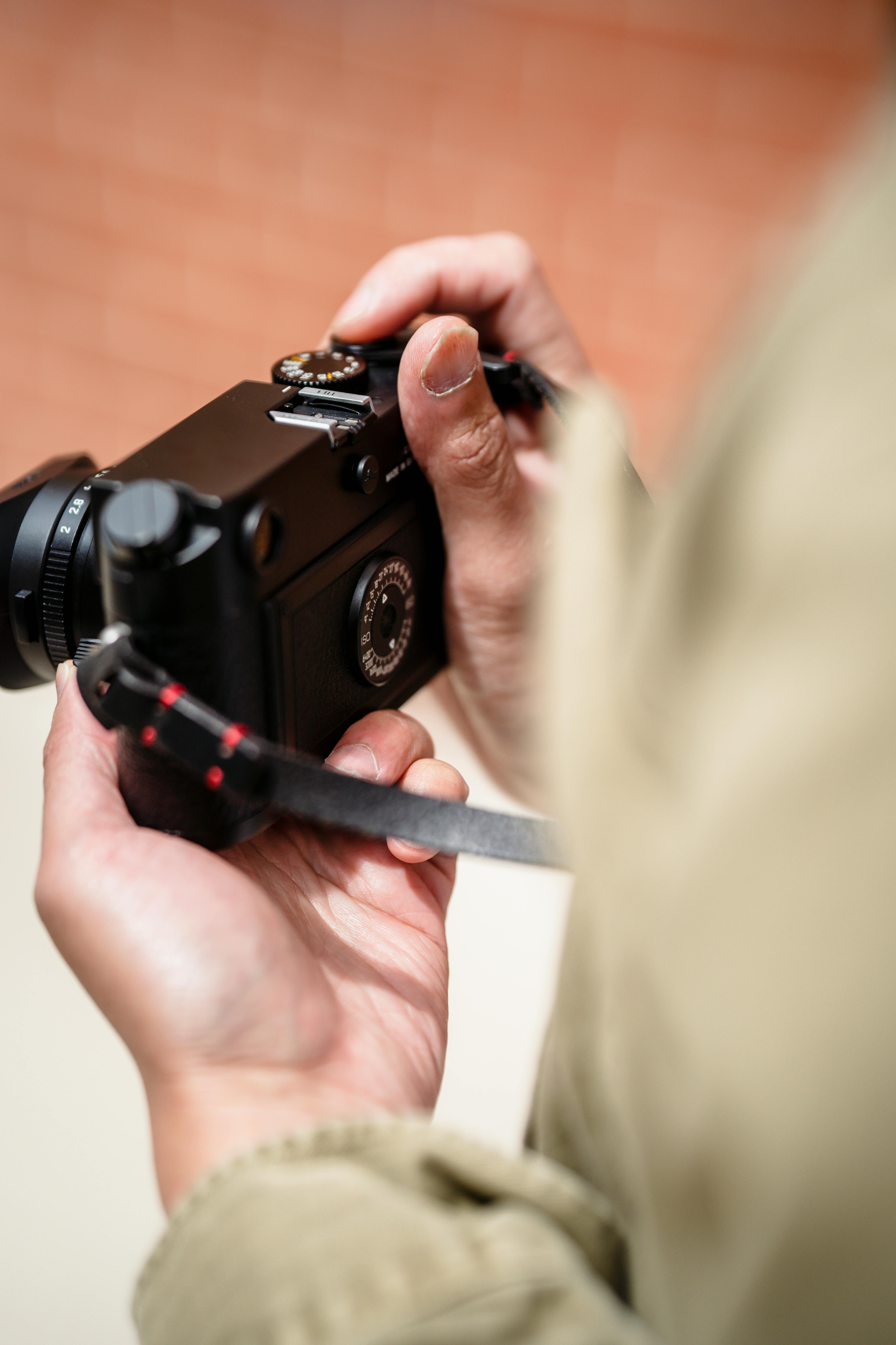 Hands Holding Camera · Free Stock Photo