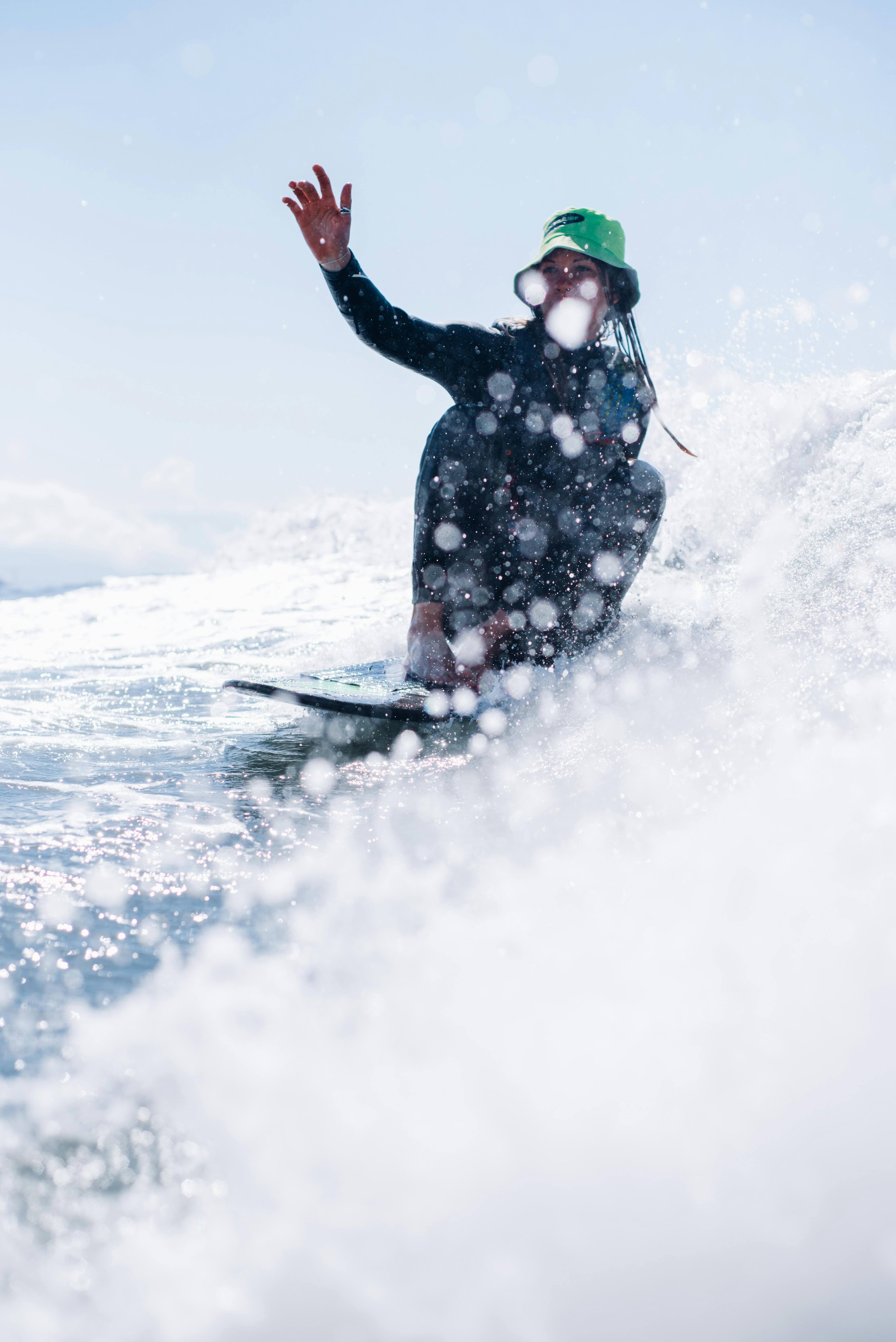Man Surfing in the Blue Ocean · Free Stock Photo
