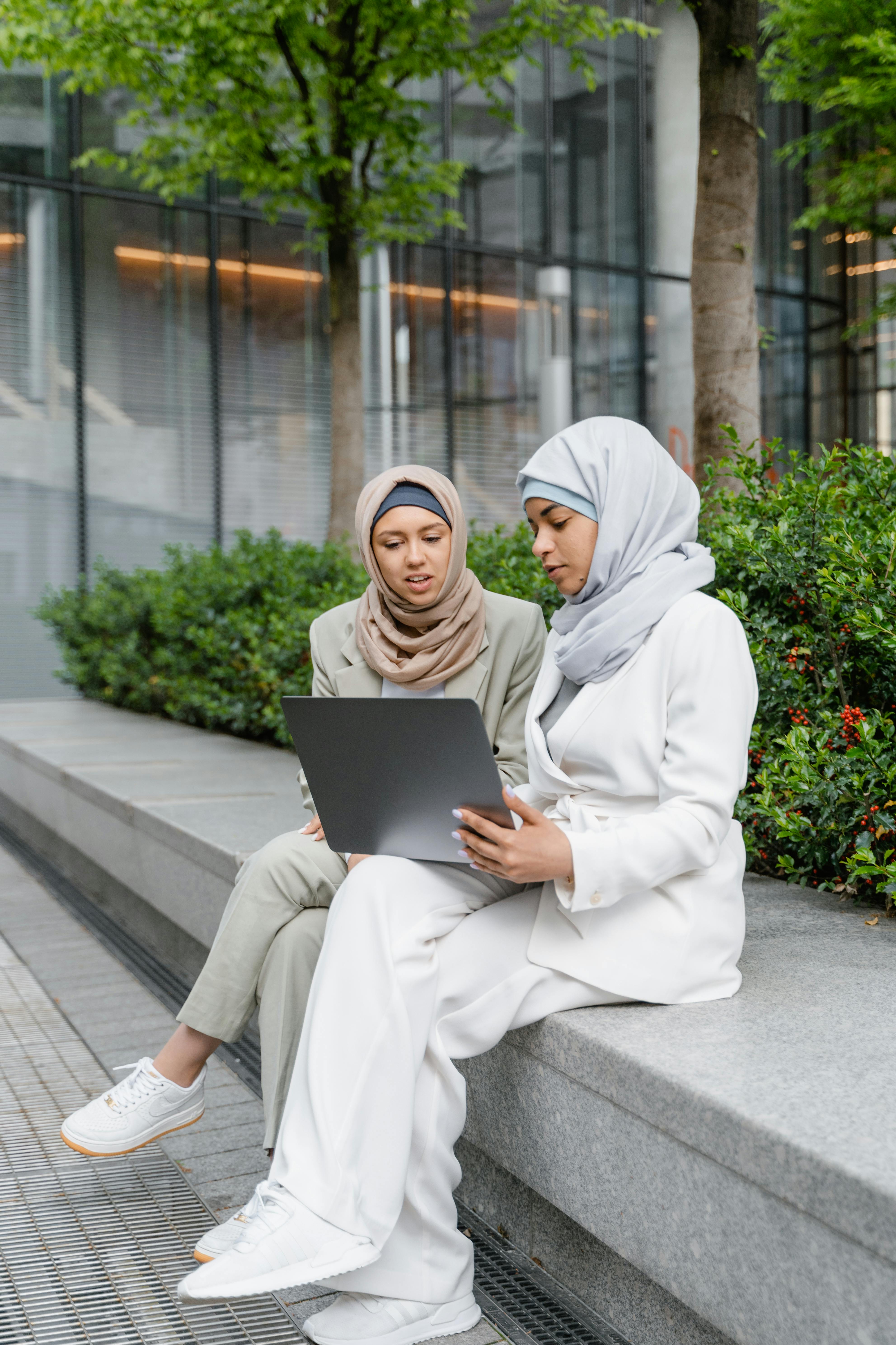 Woman in White Hijab Using Black Laptop Computer · Free Stock Photo