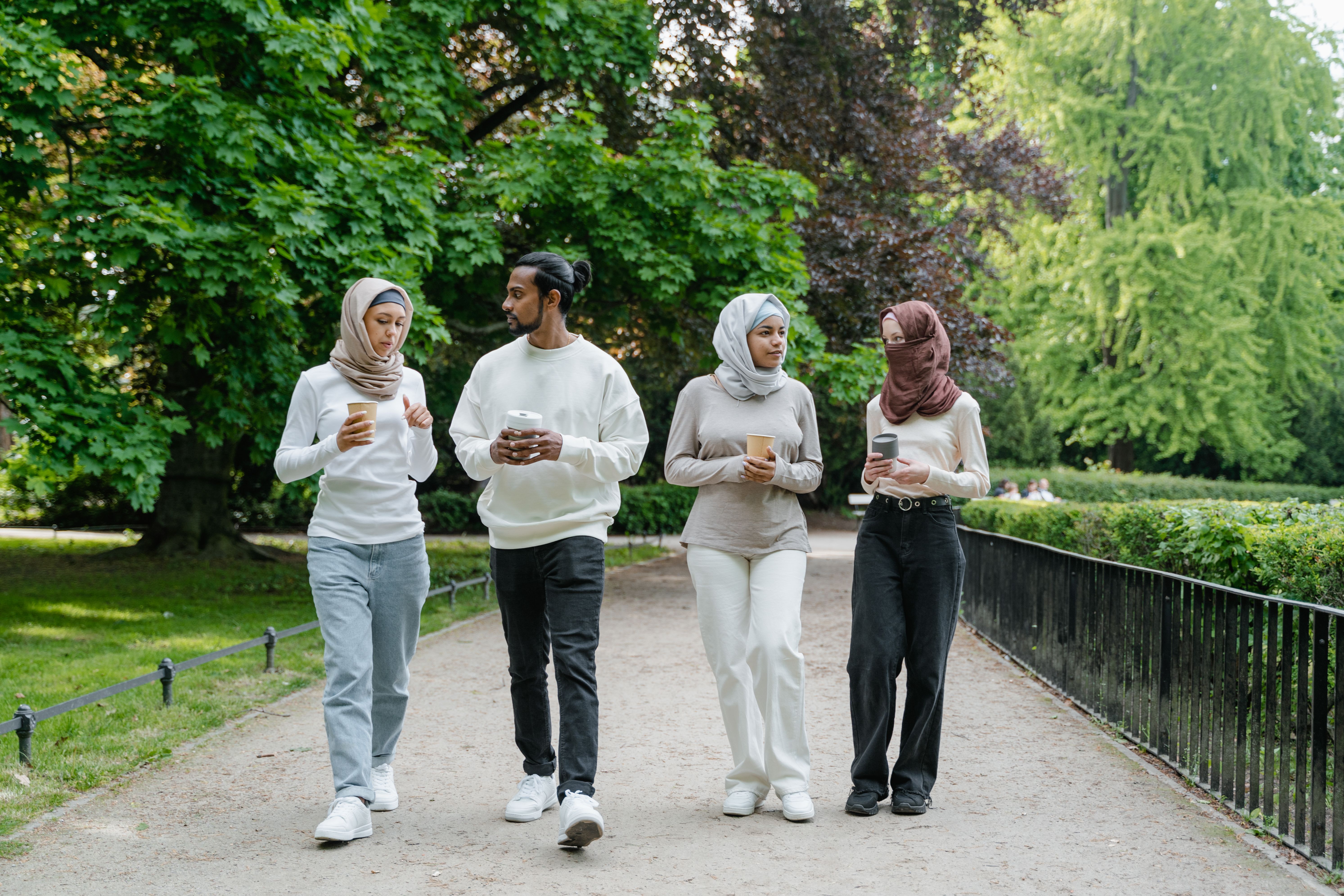 People Walking While Holding Coffee · Free Stock Photo