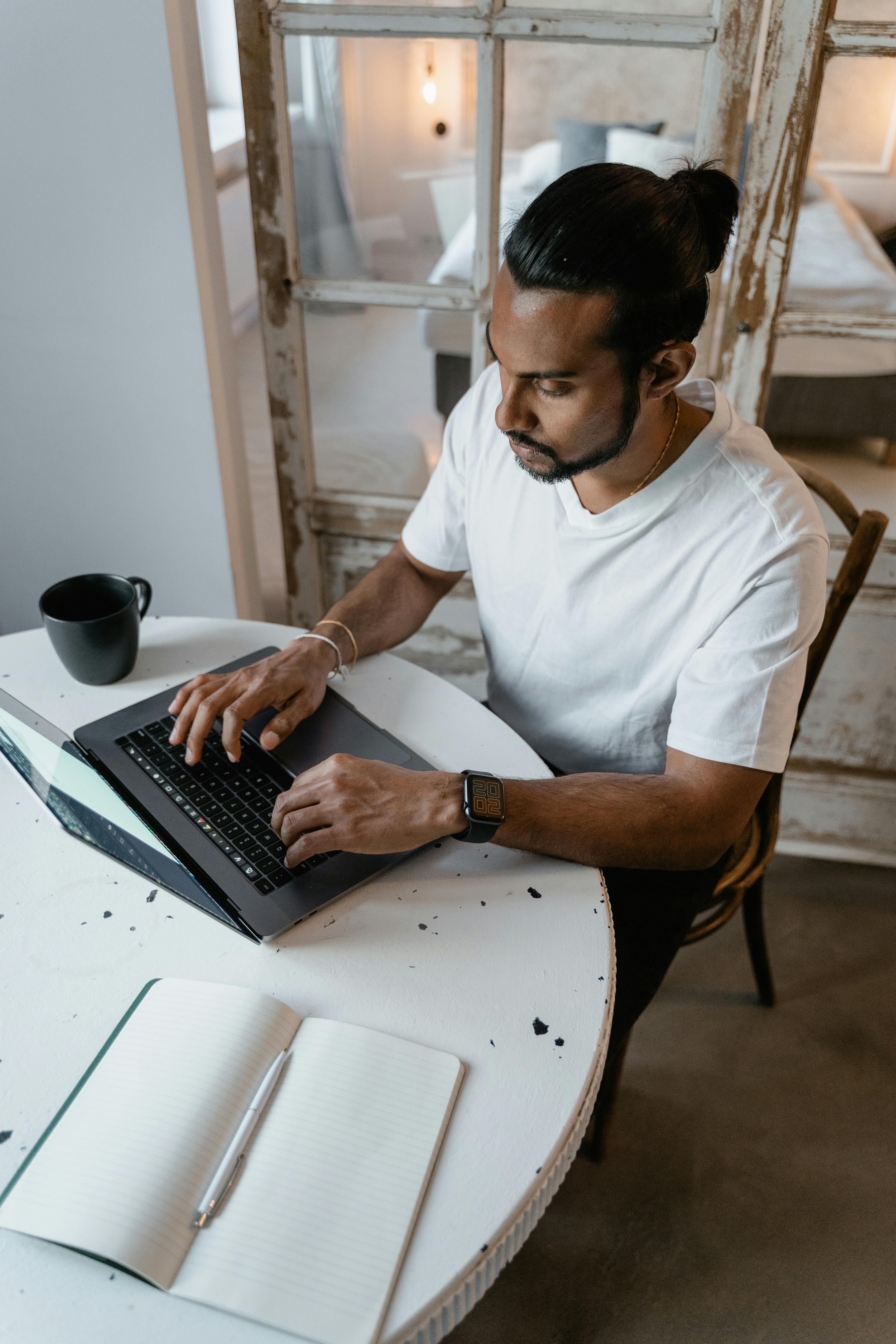 A Man using Laptop · Free Stock Photo
