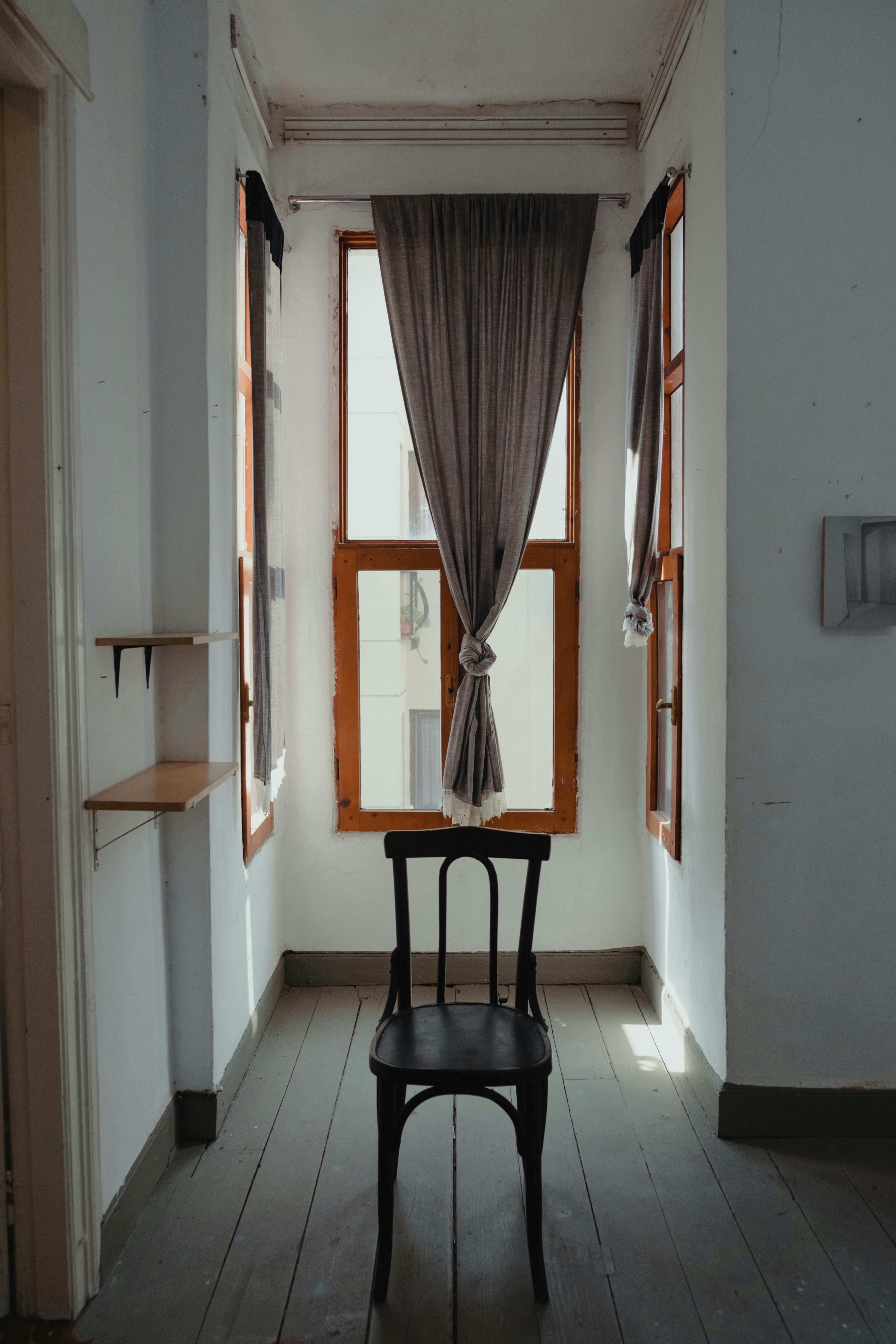 Wooden Chair in Corridor · Free Stock Photo