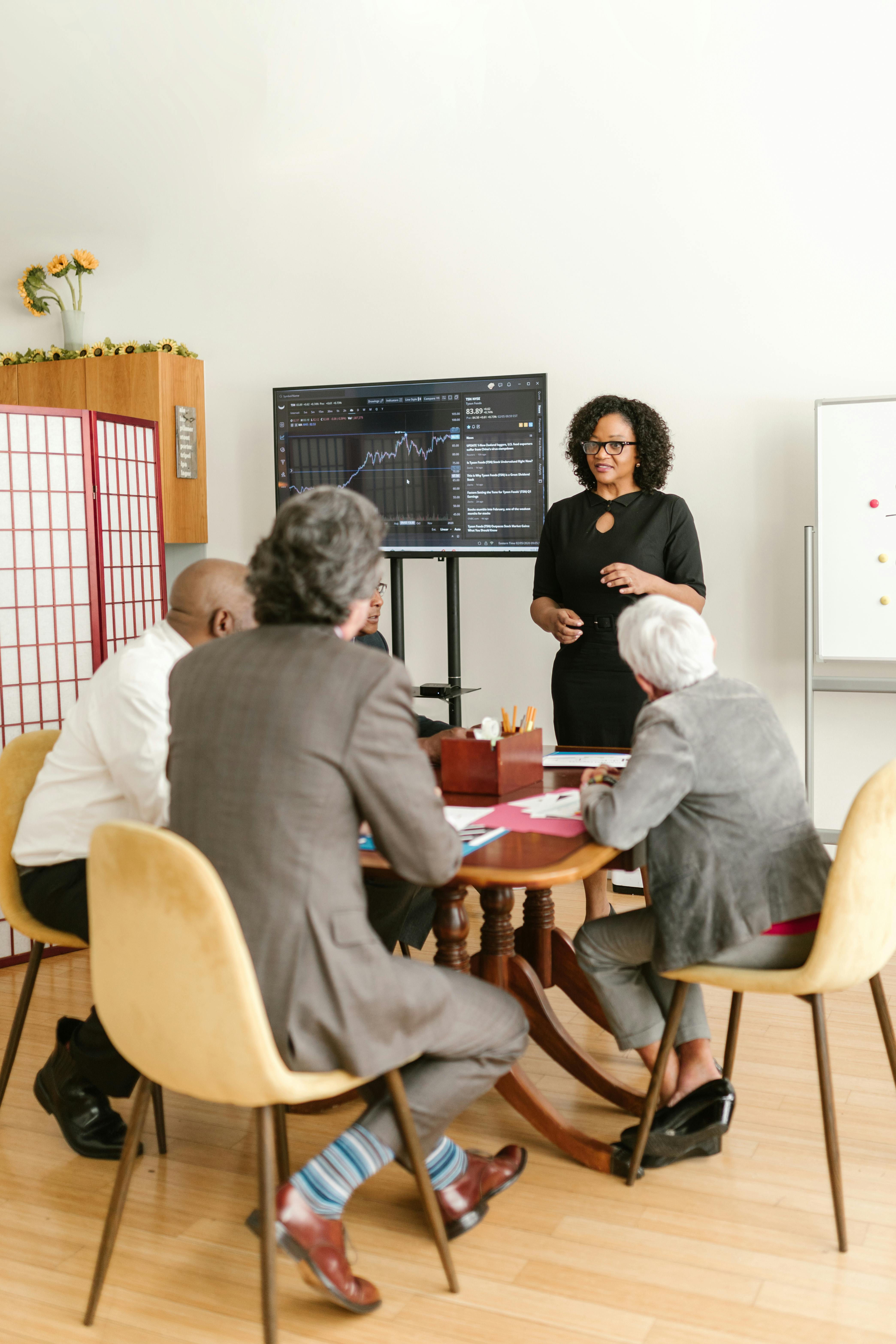 People Looking at the Man Presenting · Free Stock Photo