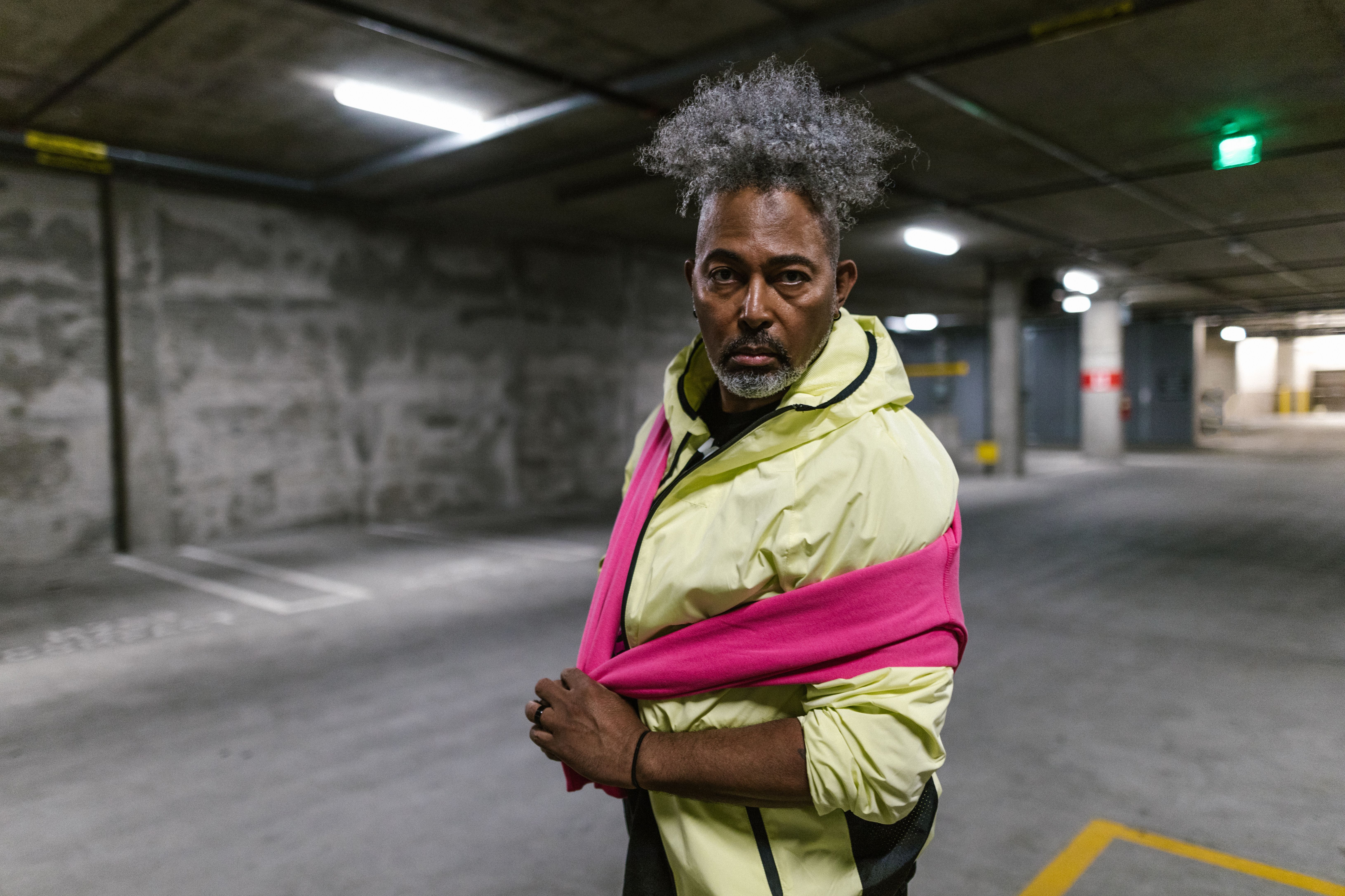 Stylish Man in Neon Green Jacket · Free Stock Photo