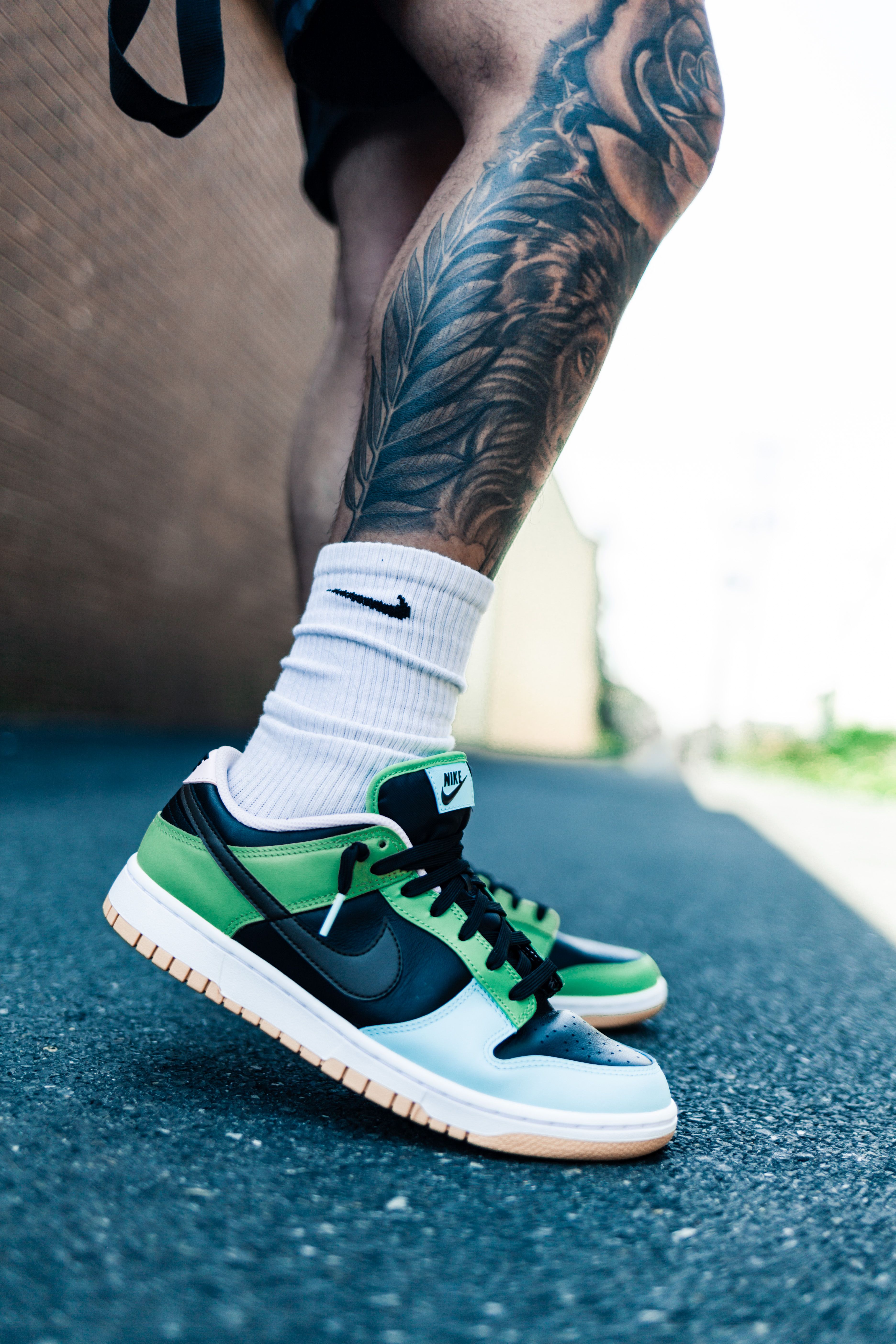 Person Wearing Nike Sneakers · Free Stock Photo