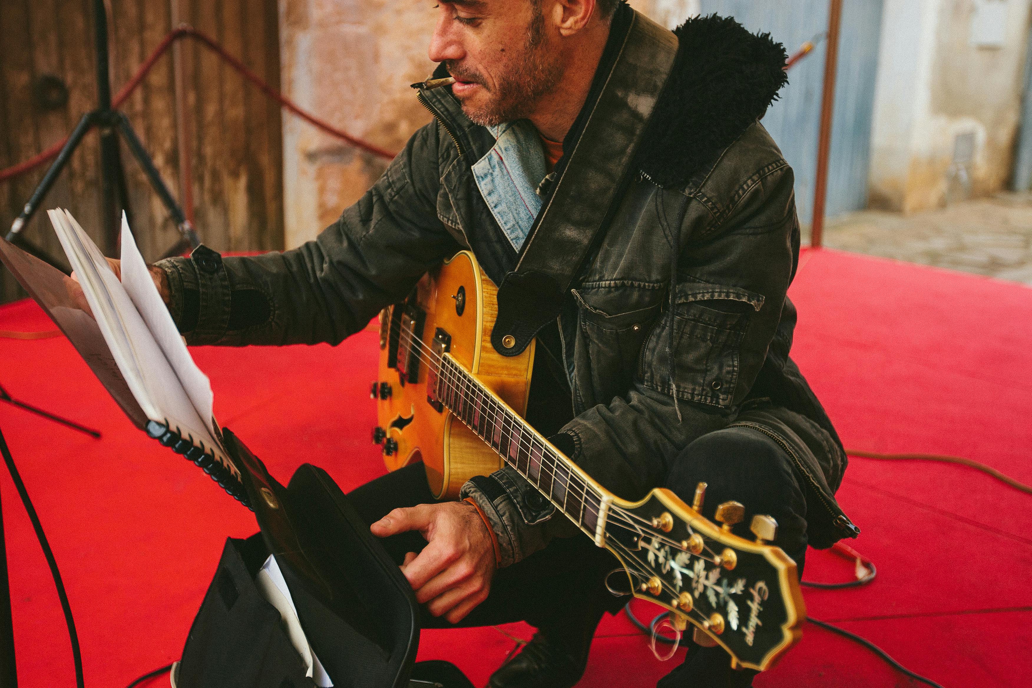 Back View of a Person Sitting Smoking · Free Stock Photo