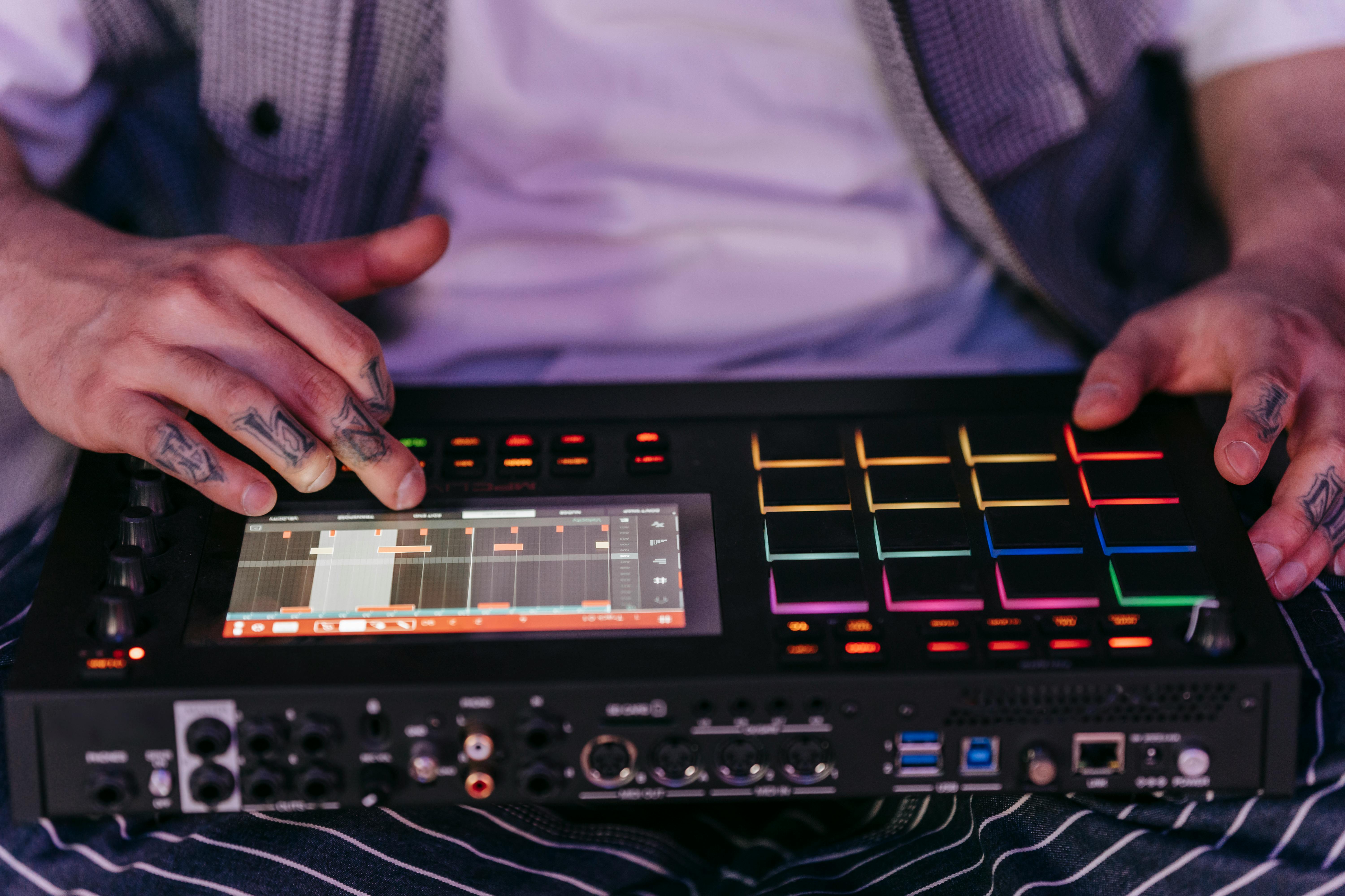A Person Using a Music Sequencer · Free Stock Photo