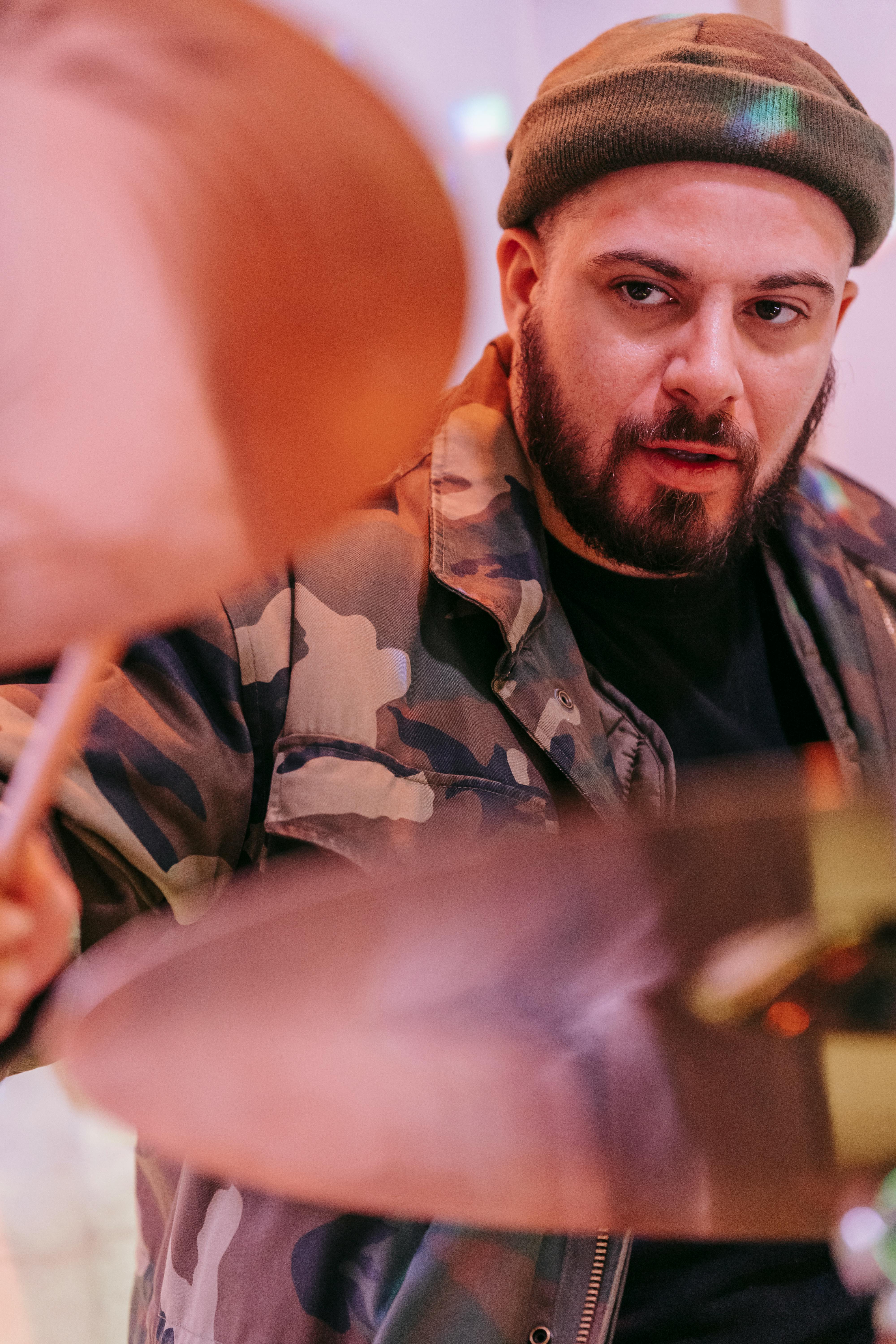Portrait of Drummer Performing · Free Stock Photo