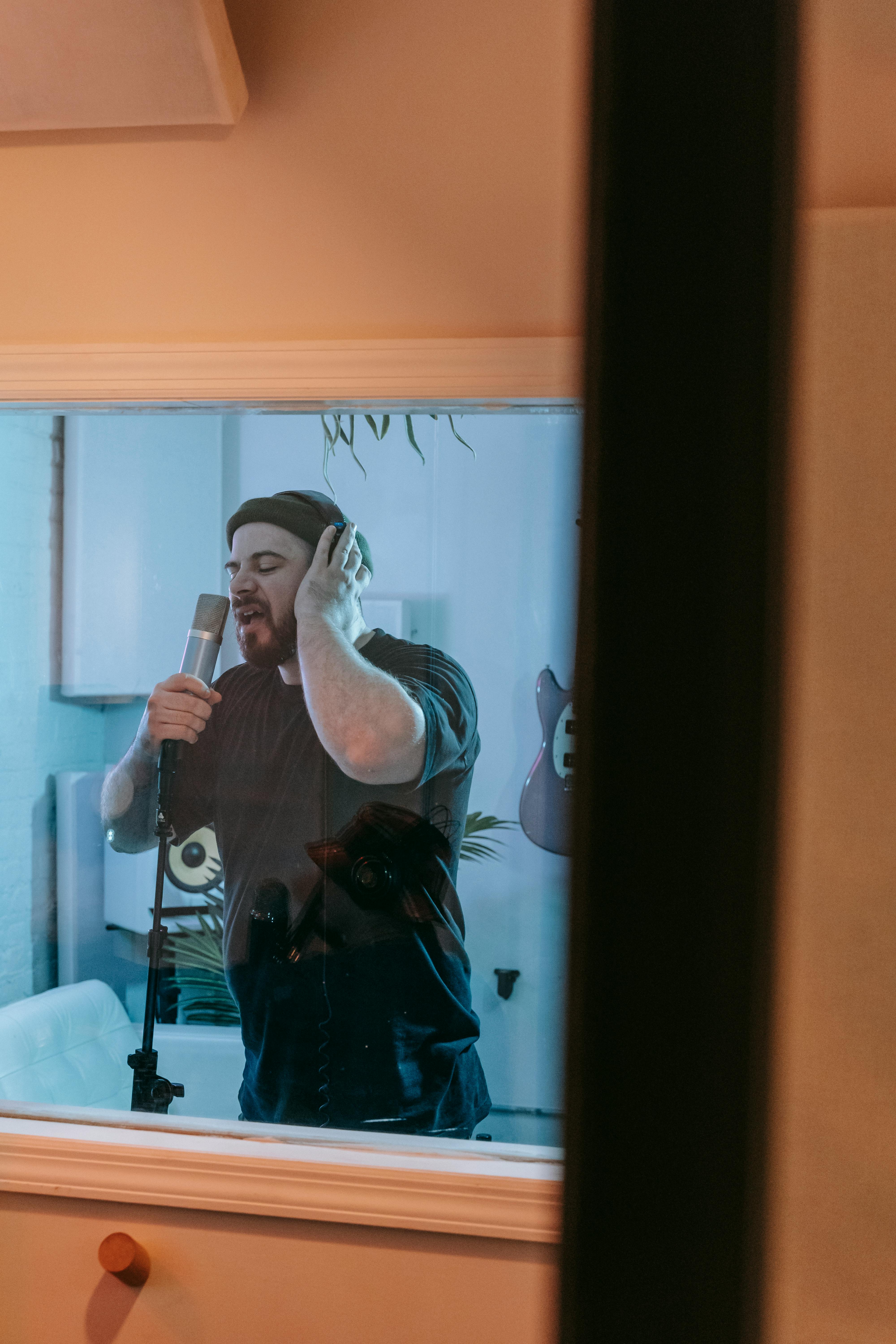 Man Recording Music in Studio · Free Stock Photo