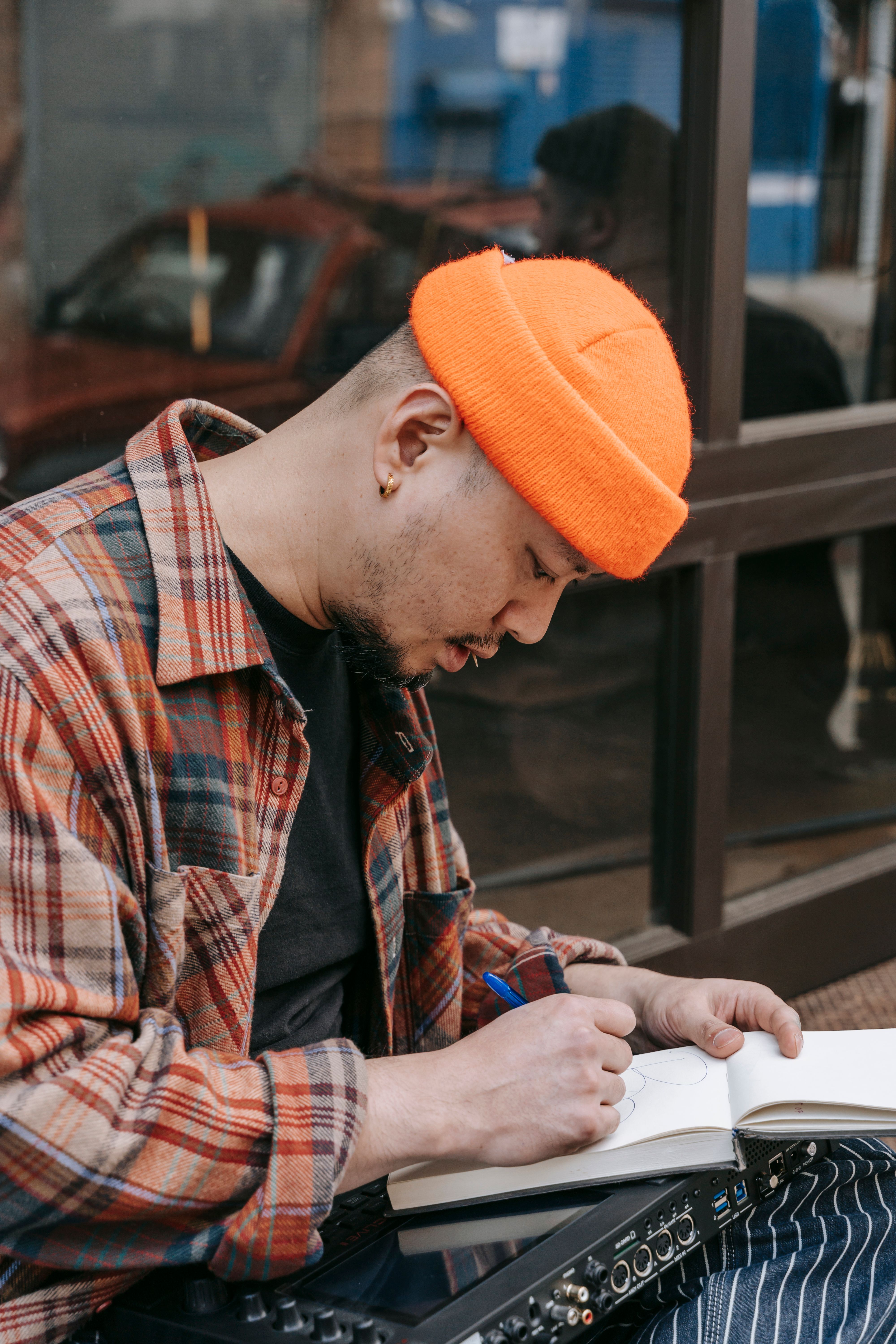 Man in Orange Knit Cap and Plaid Shirt · Free Stock Photo