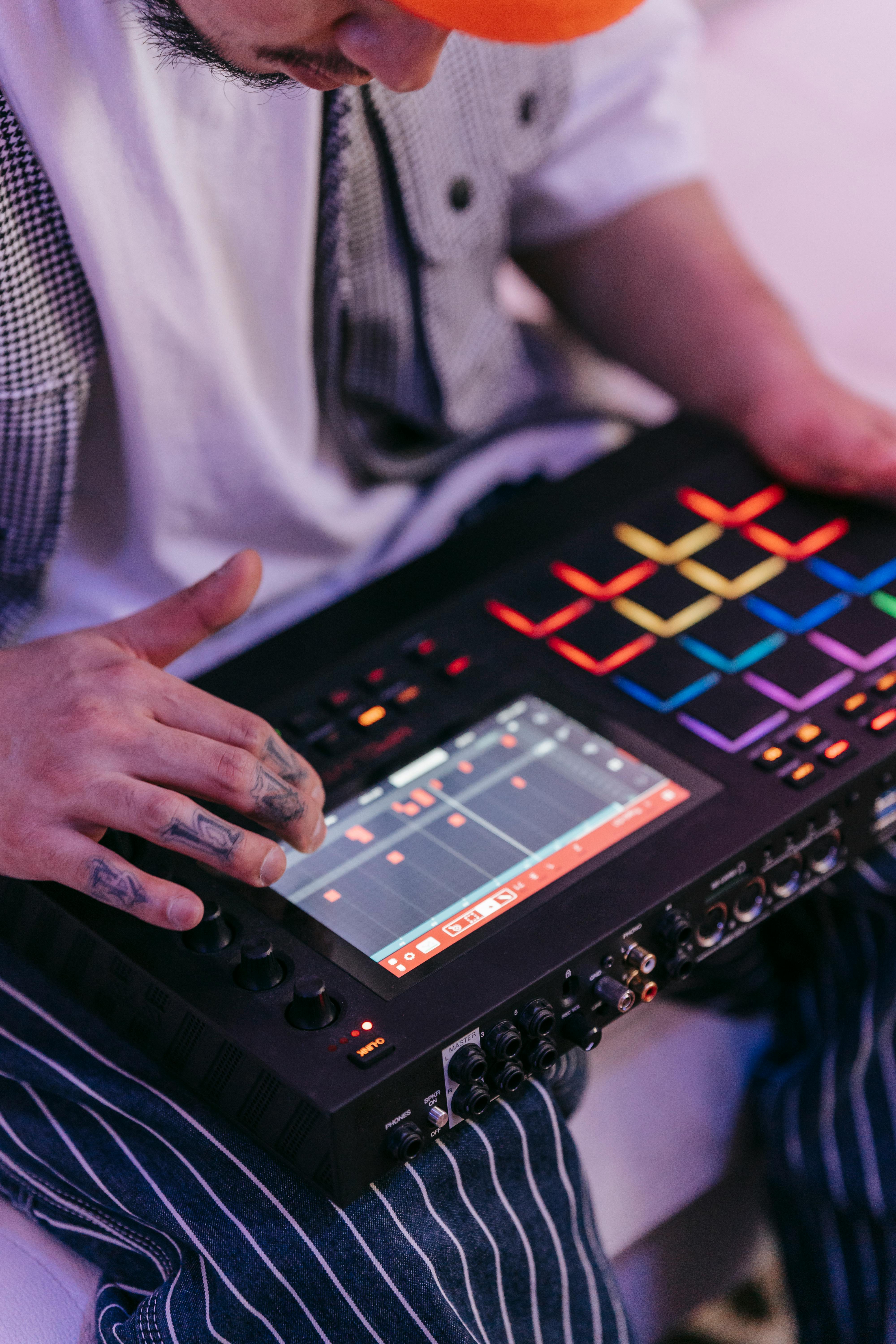 Producer with Musical Equipment · Free Stock Photo