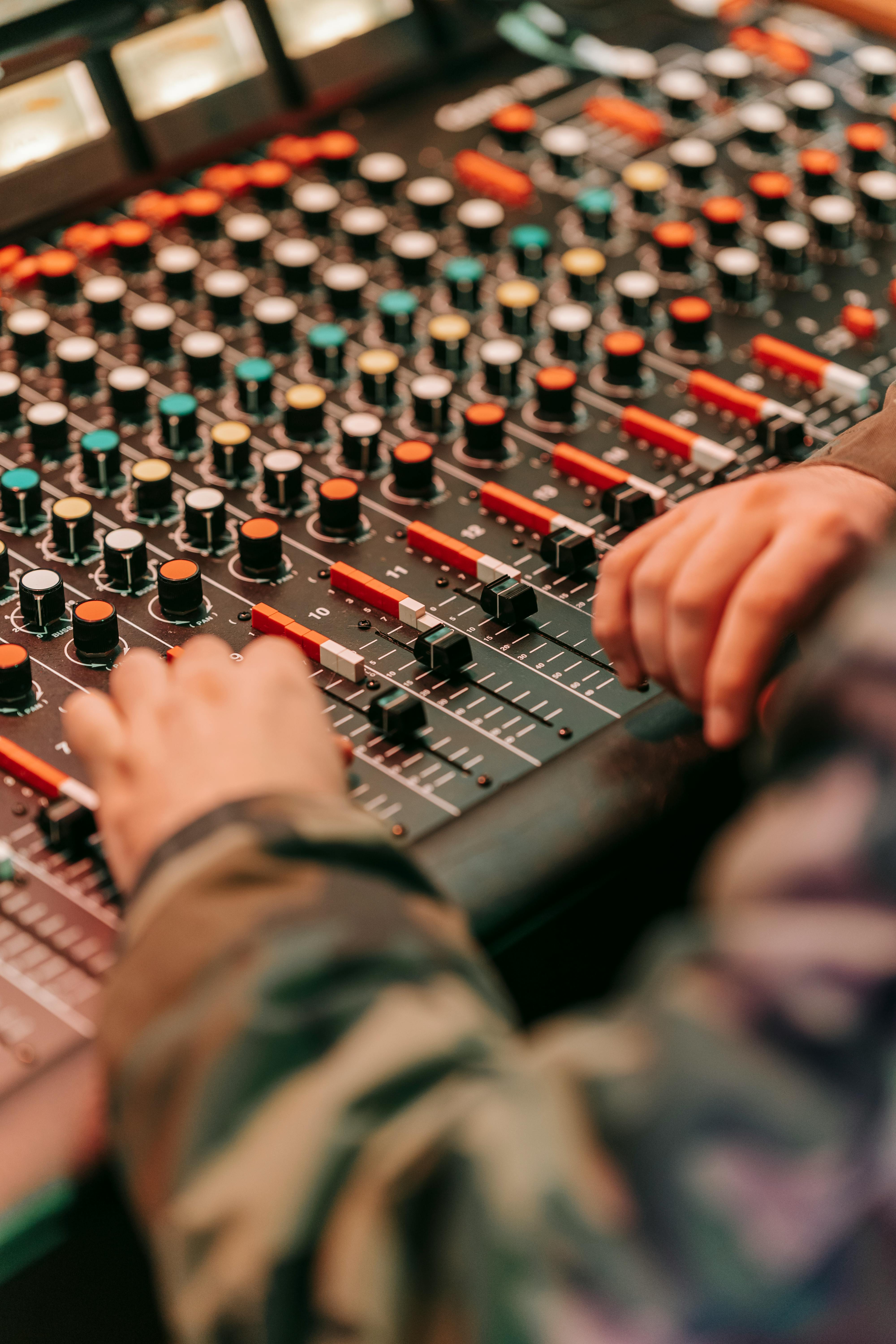 Person Using Audio Mixer · Free Stock Photo
