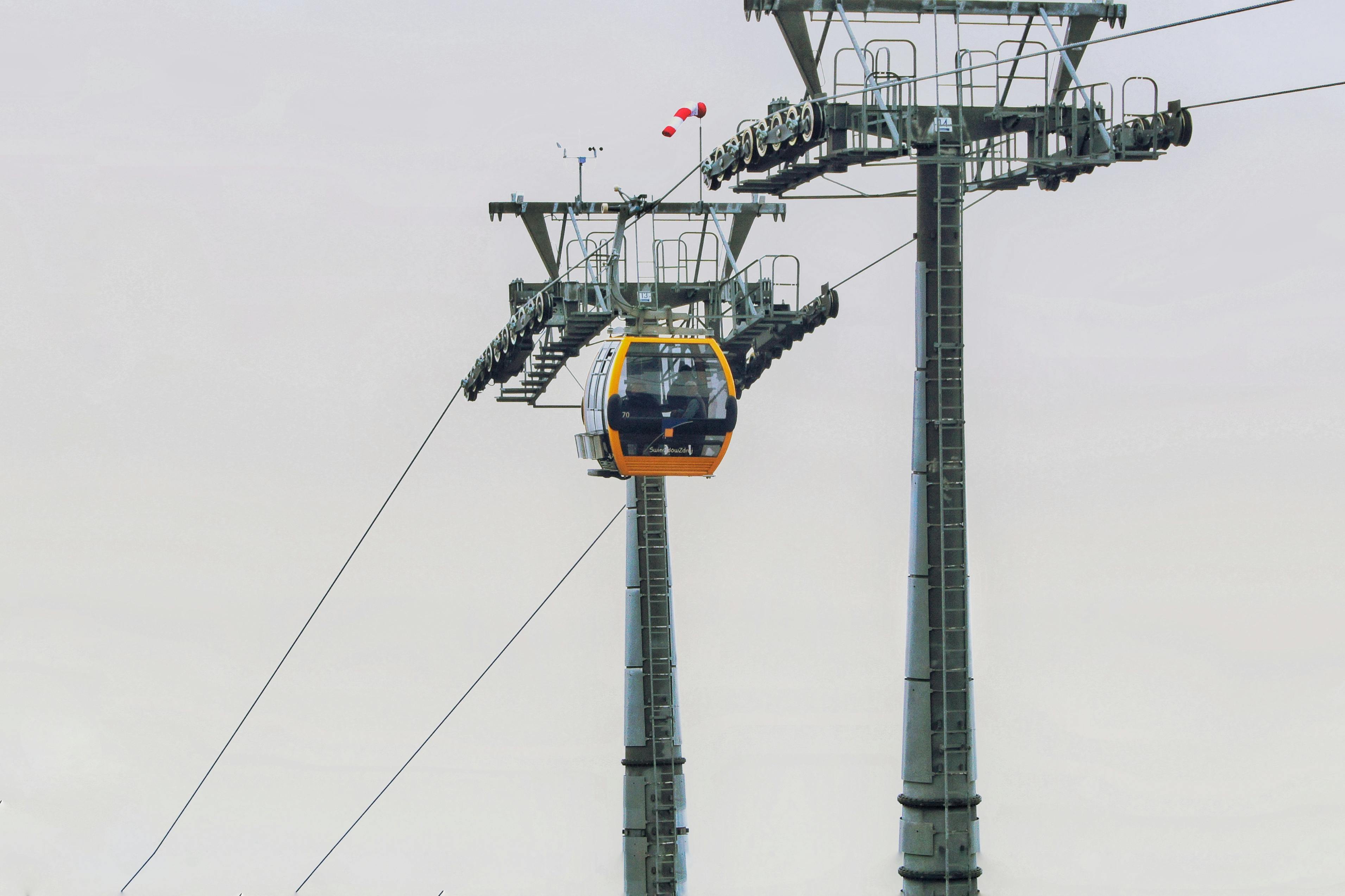Two Yellow Cable Cab With Red in the Middle · Free Stock Photo