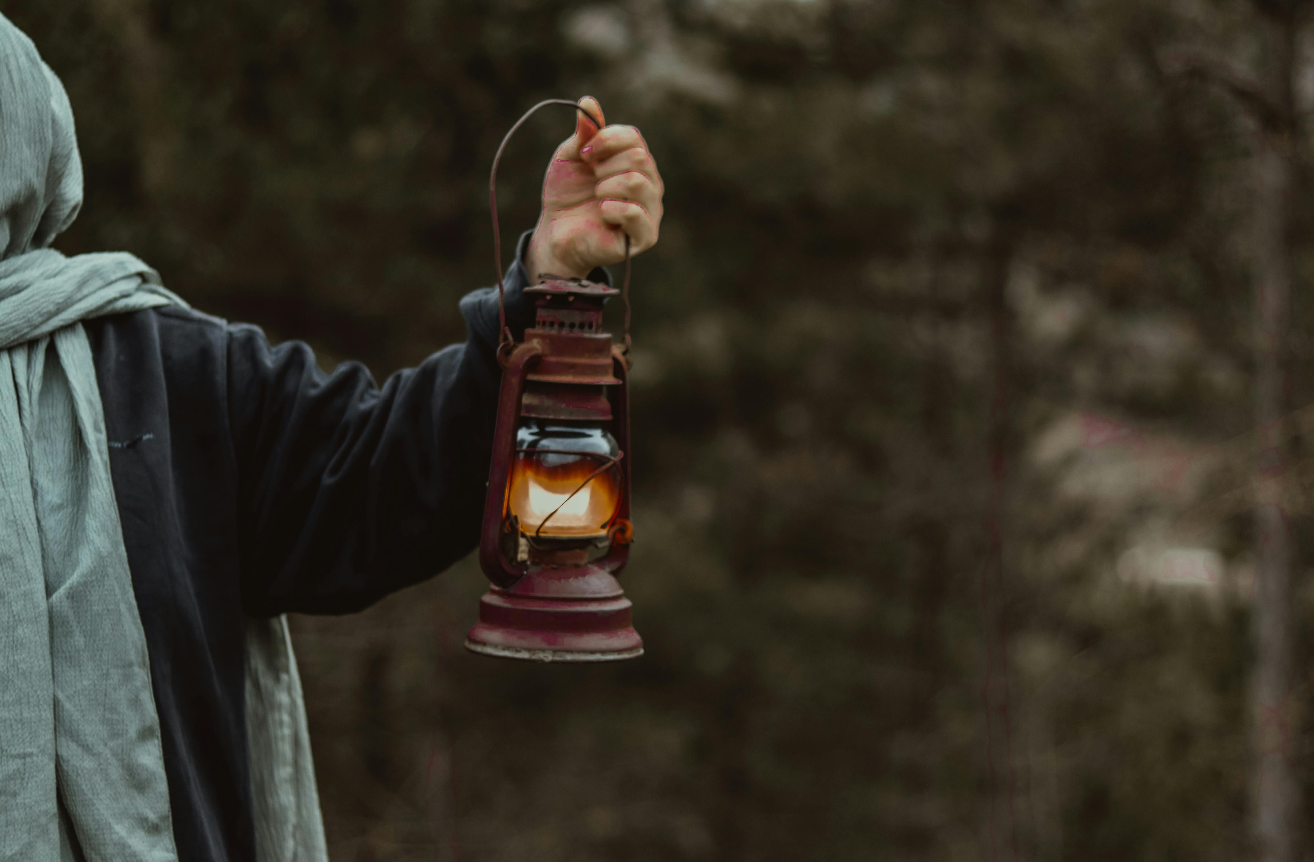 Person Holding a Lantern · Free Stock Photo