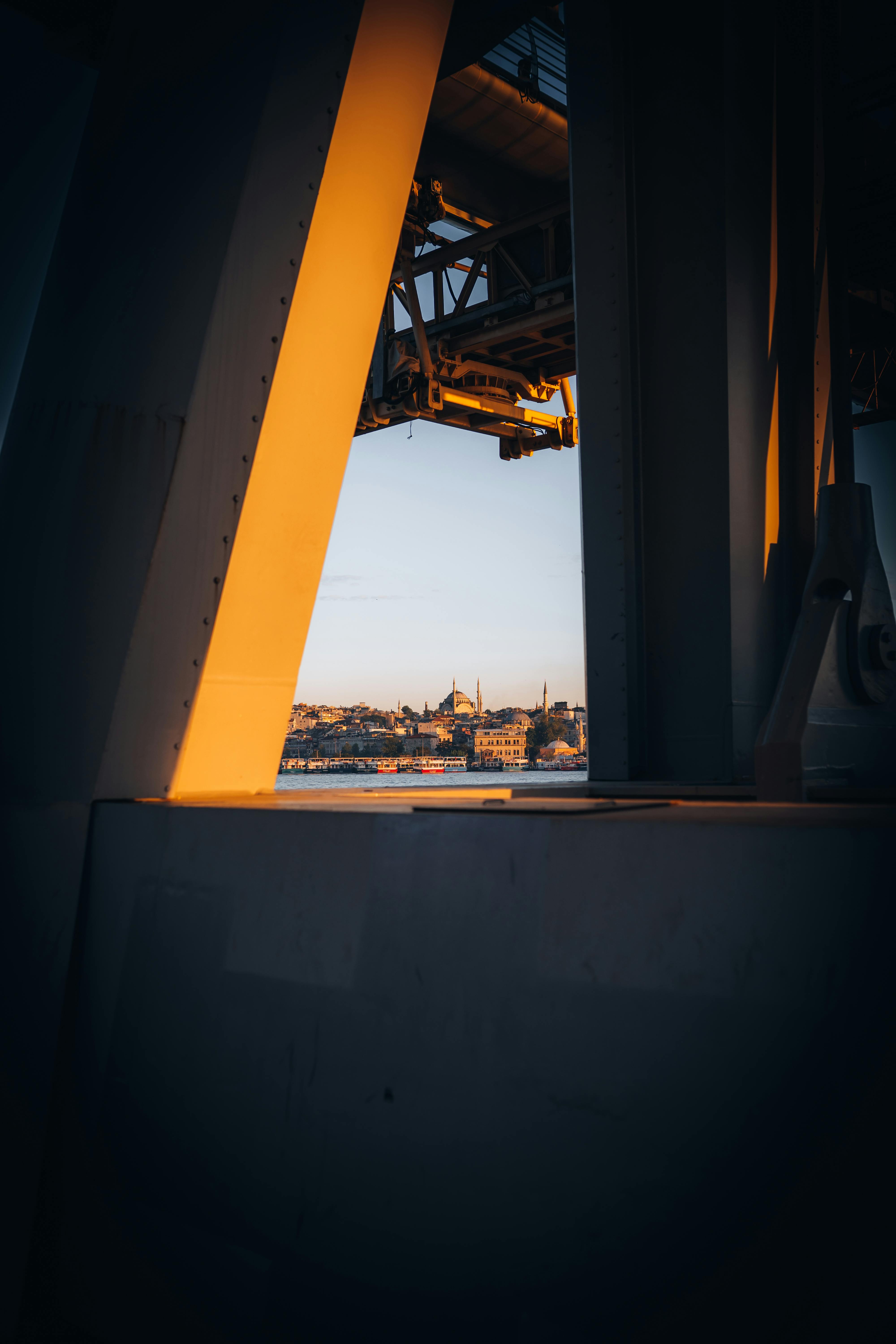 A View of the City from Under a Bridge · Free Stock Photo