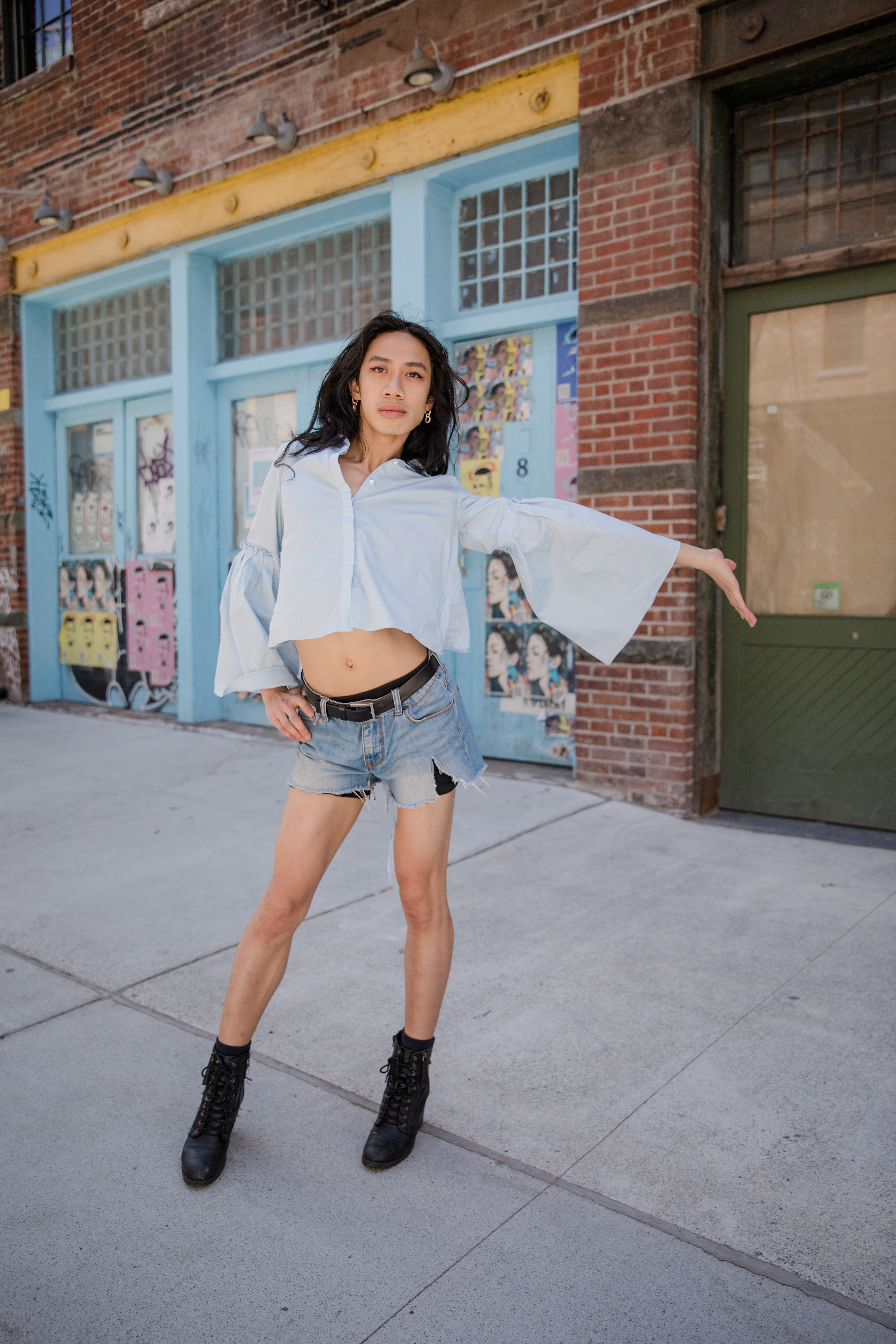 A Model Wearing a Crop Top and Denim Shorts · Free Stock Photo
