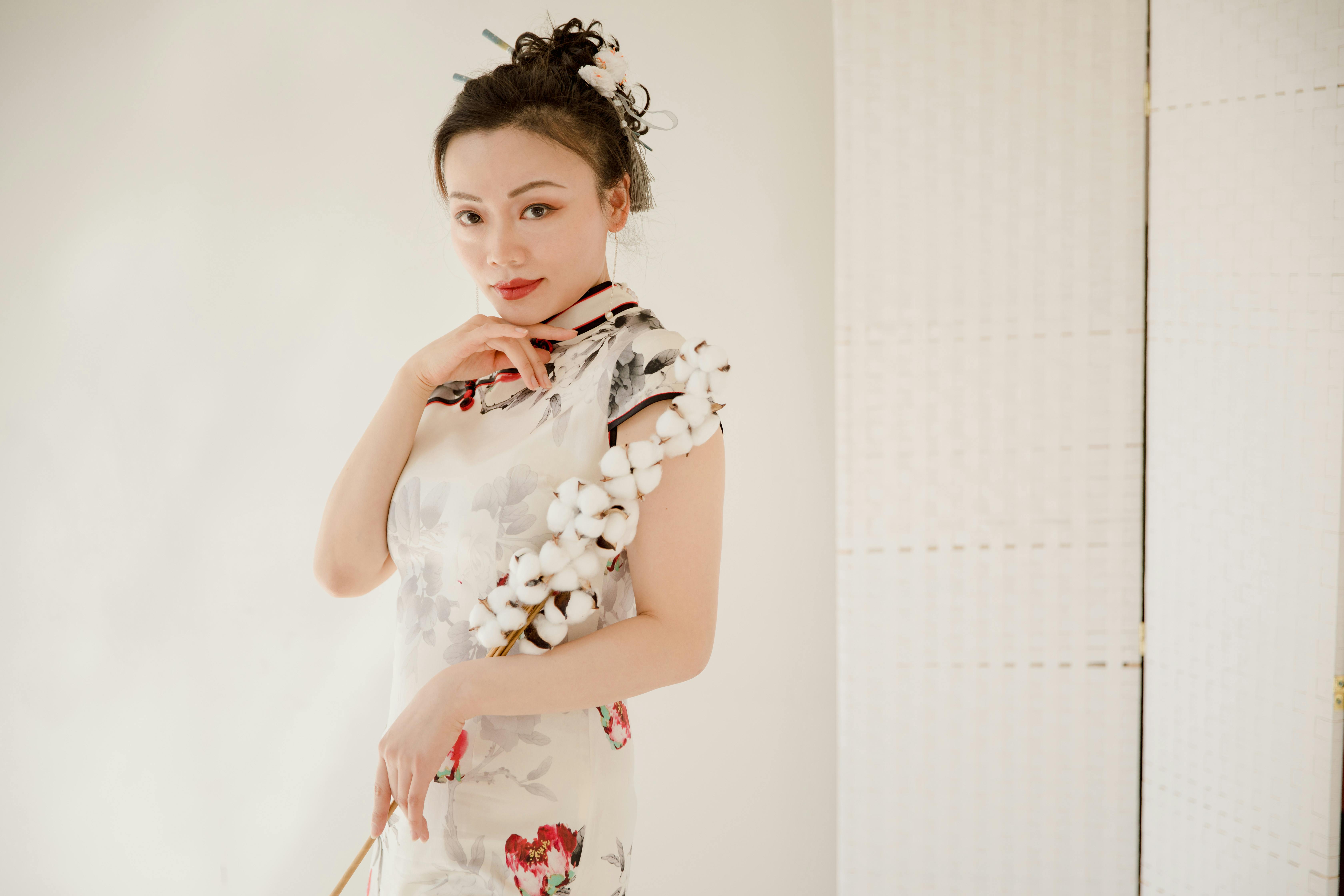 A Pretty Woman in a Cheongsam · Free Stock Photo