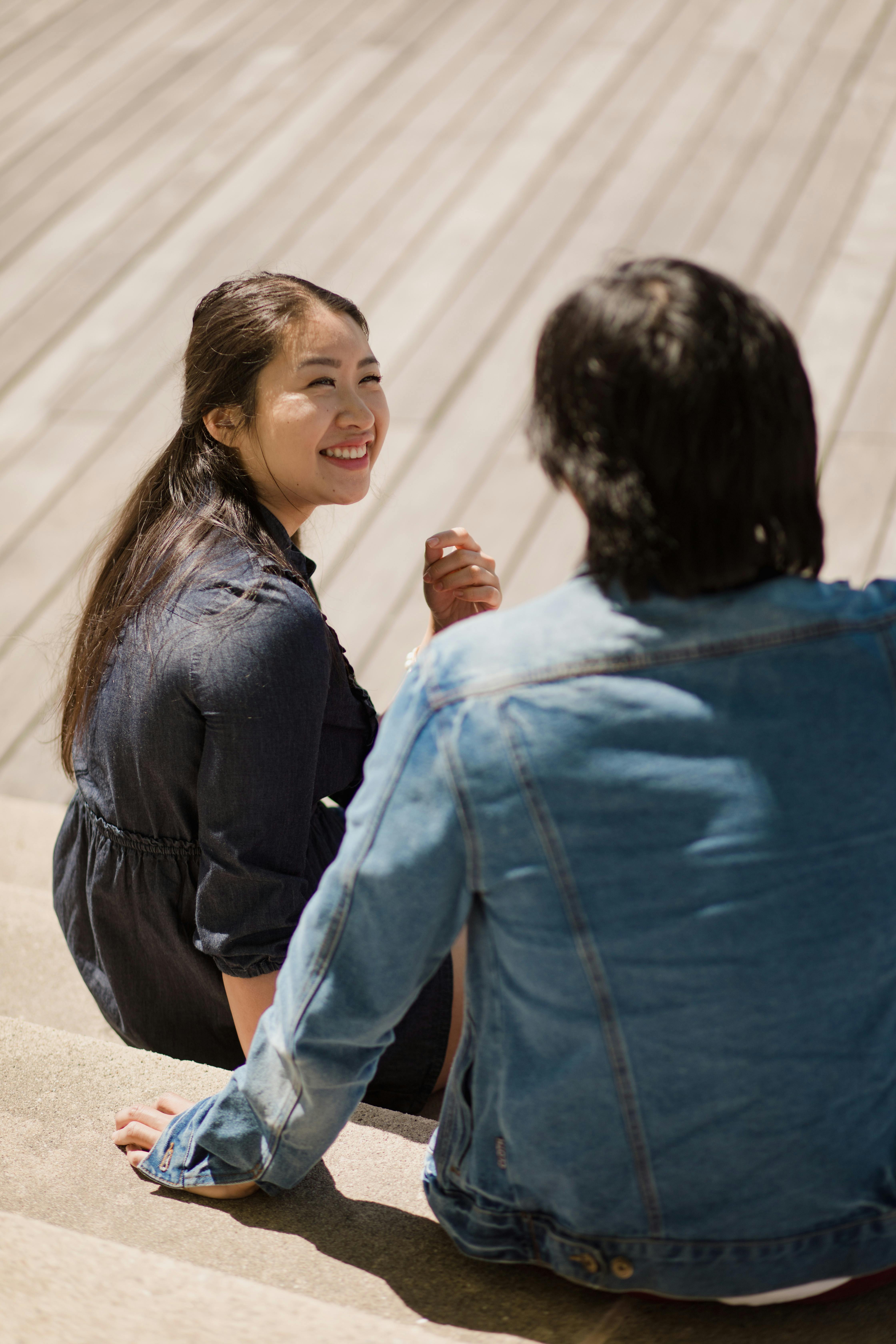 A Couple Sitting Together · Free Stock Photo