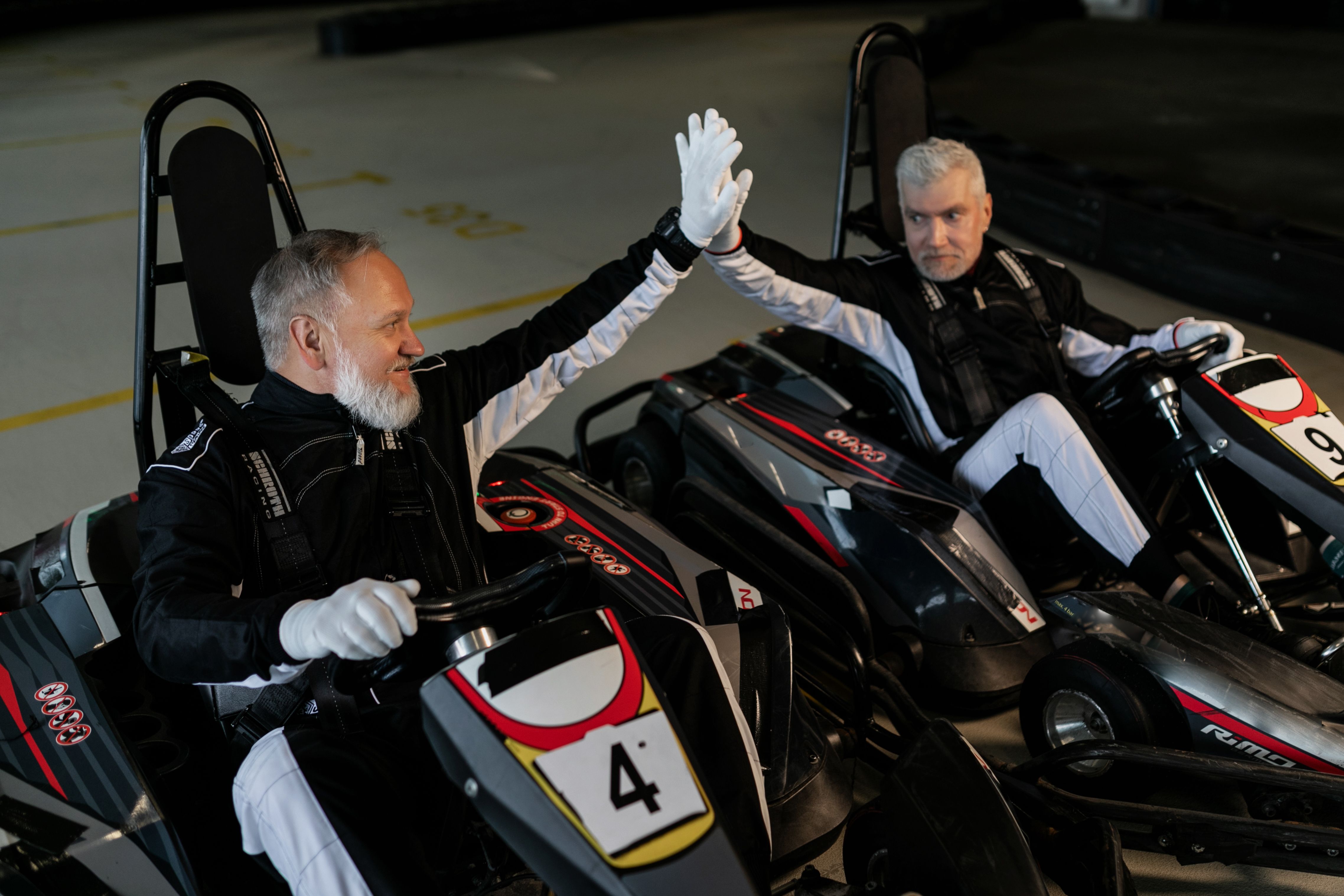 Elderly Men riding a Kart Wheel · Free Stock Photo