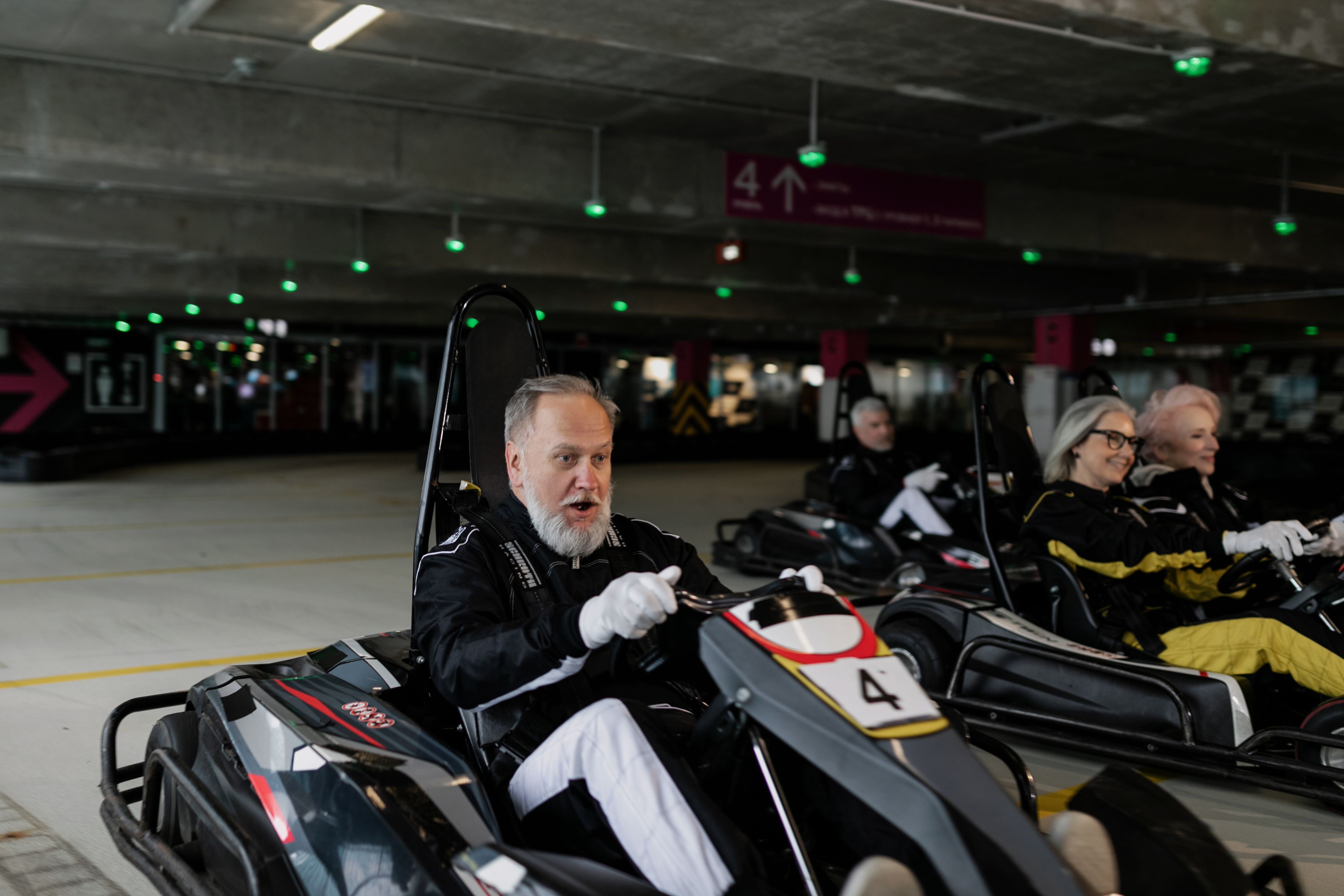 An Elderly Man Driving a Go-kart · Free Stock Photo