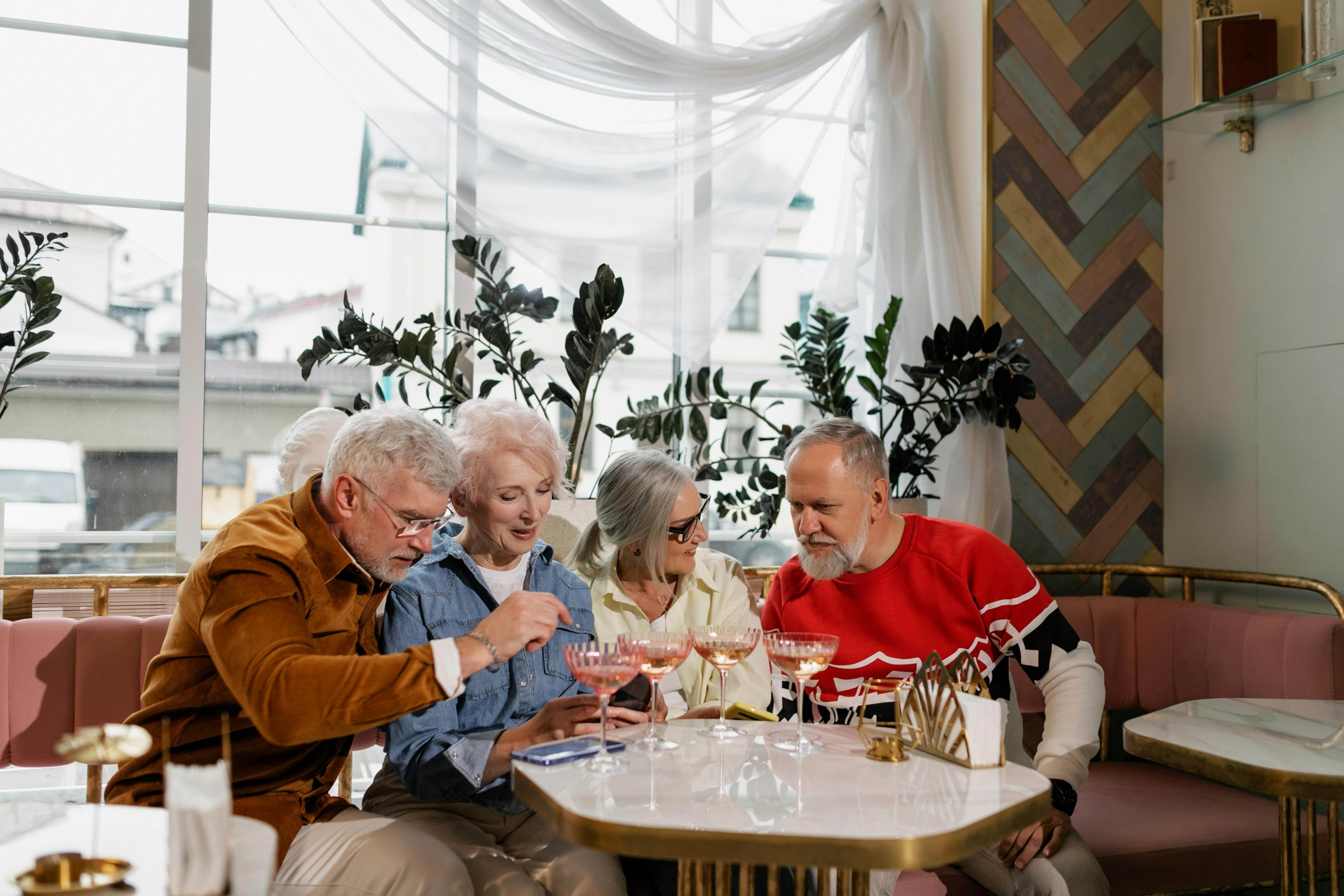 Elderly People having a Get Together · Free Stock Photo