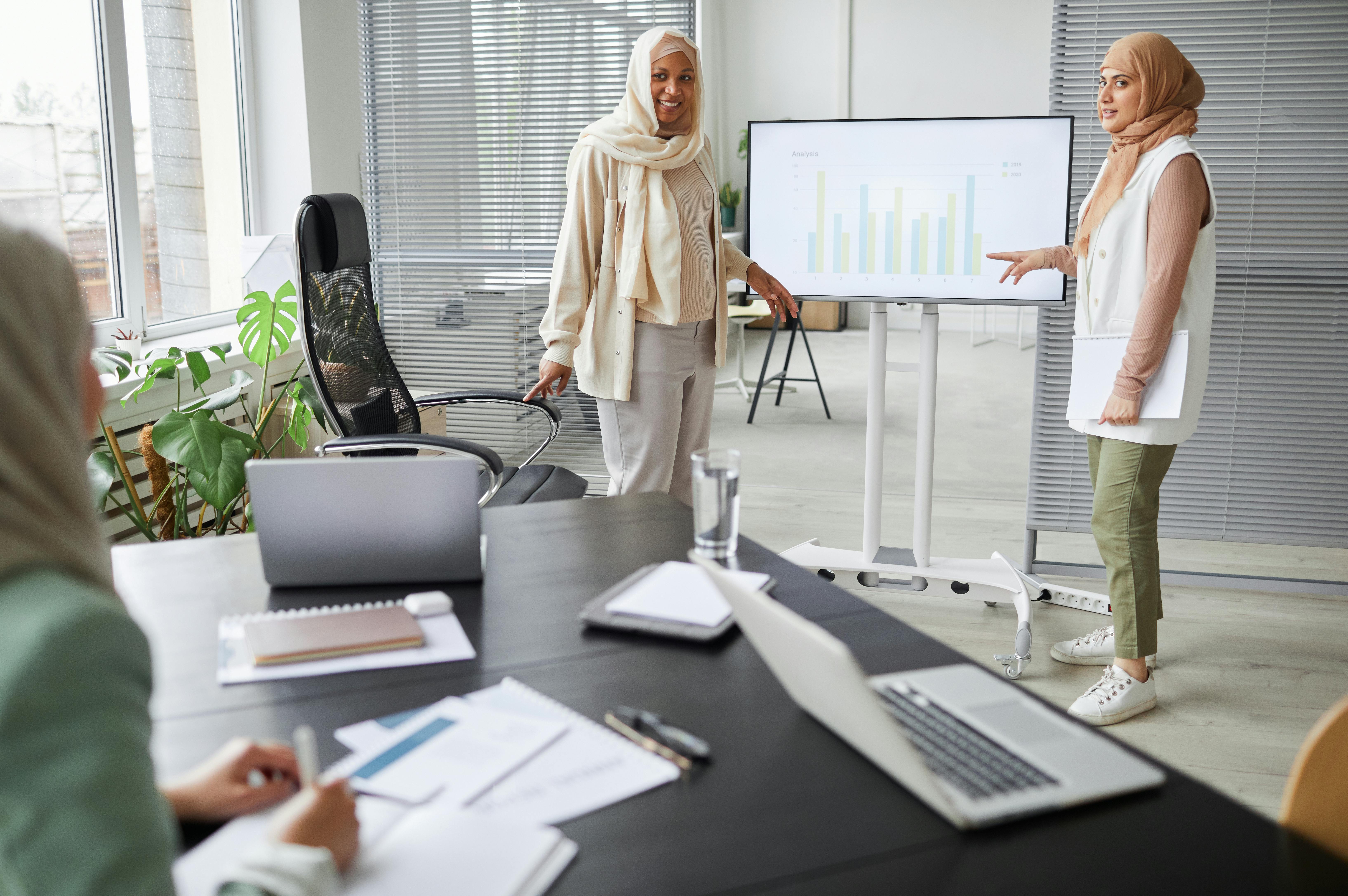 Women Presenting in the Office · Free Stock Photo
