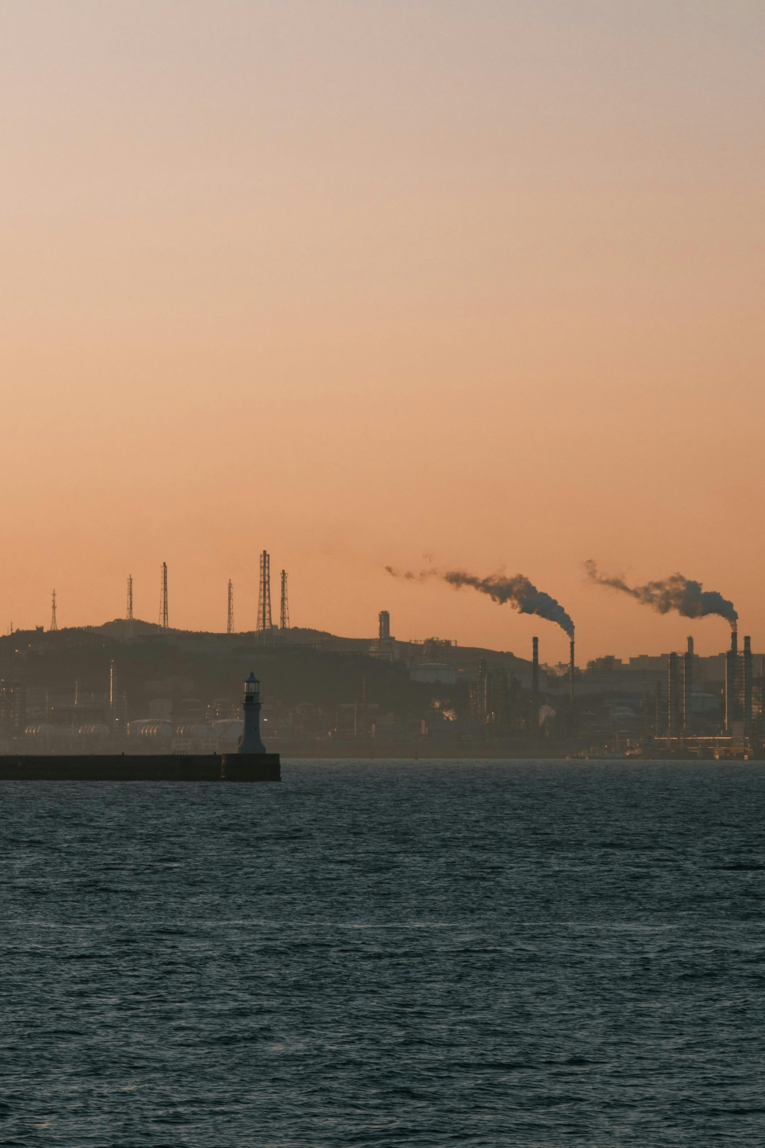 Grayscale Photography of a Factory · Free Stock Photo