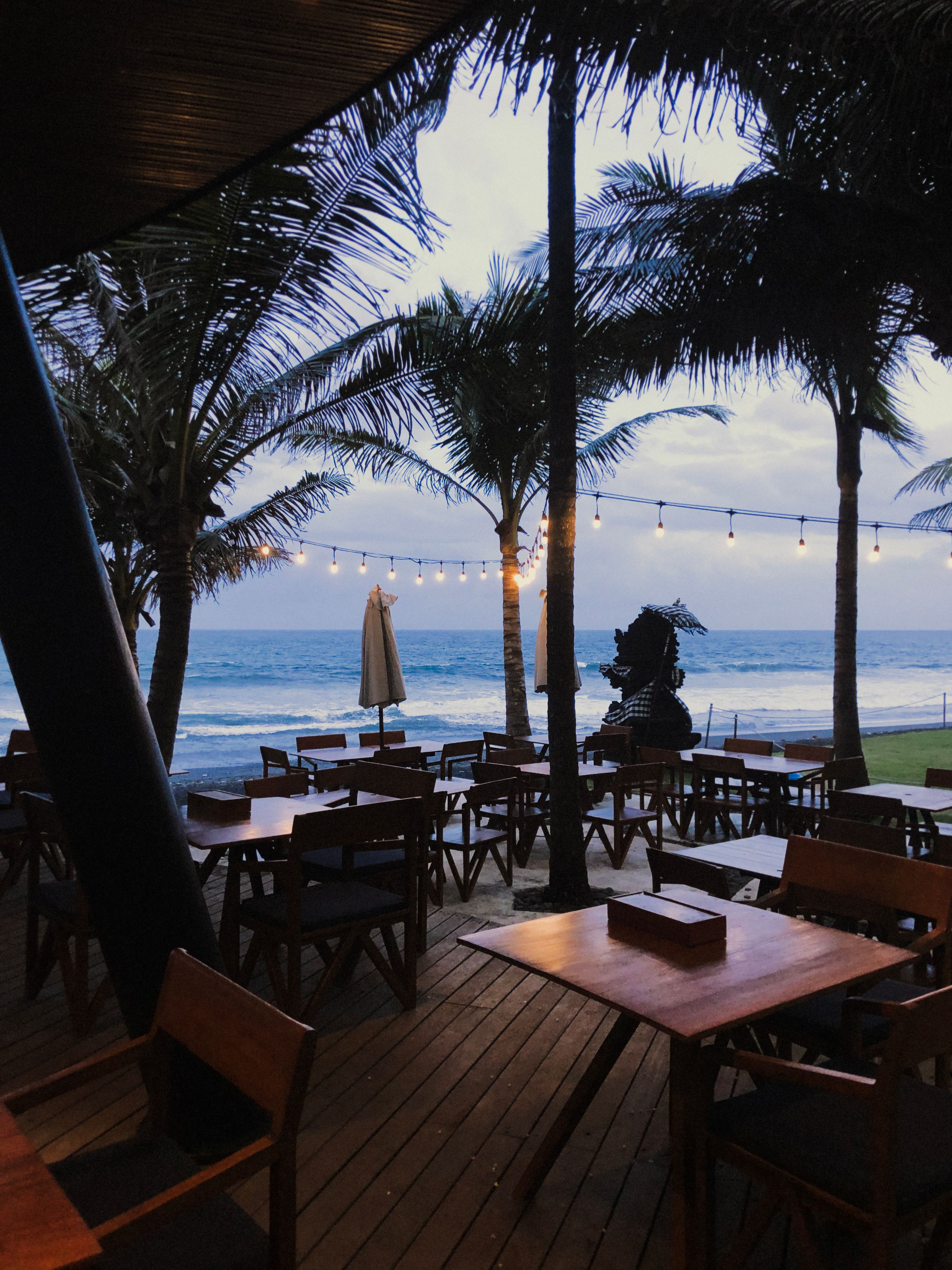 Wood Deck Restaurant Near Body of Water · Free Stock Photo