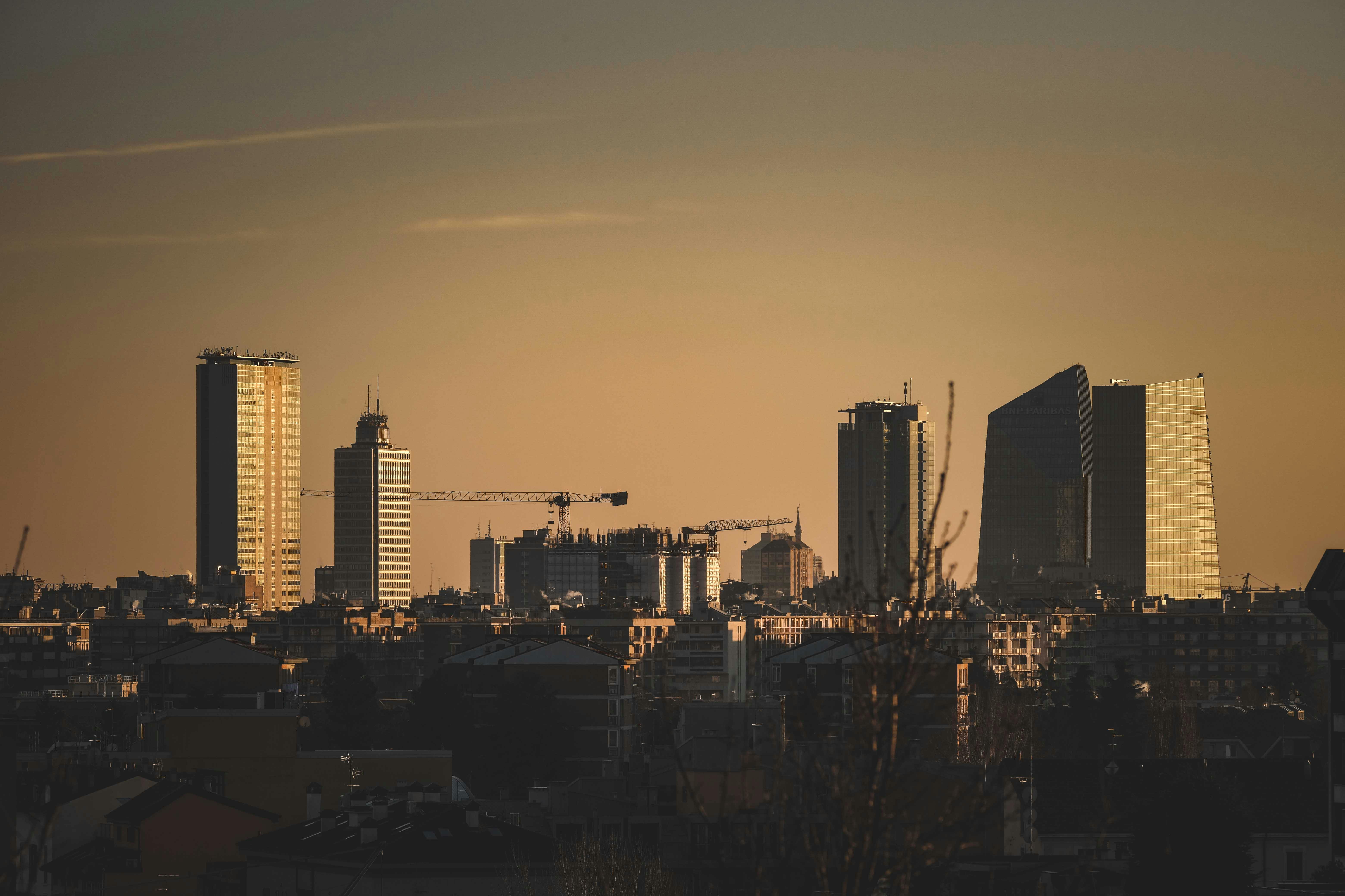 Urban Skyline with Skyscrapers at Dawn · Free Stock Photo