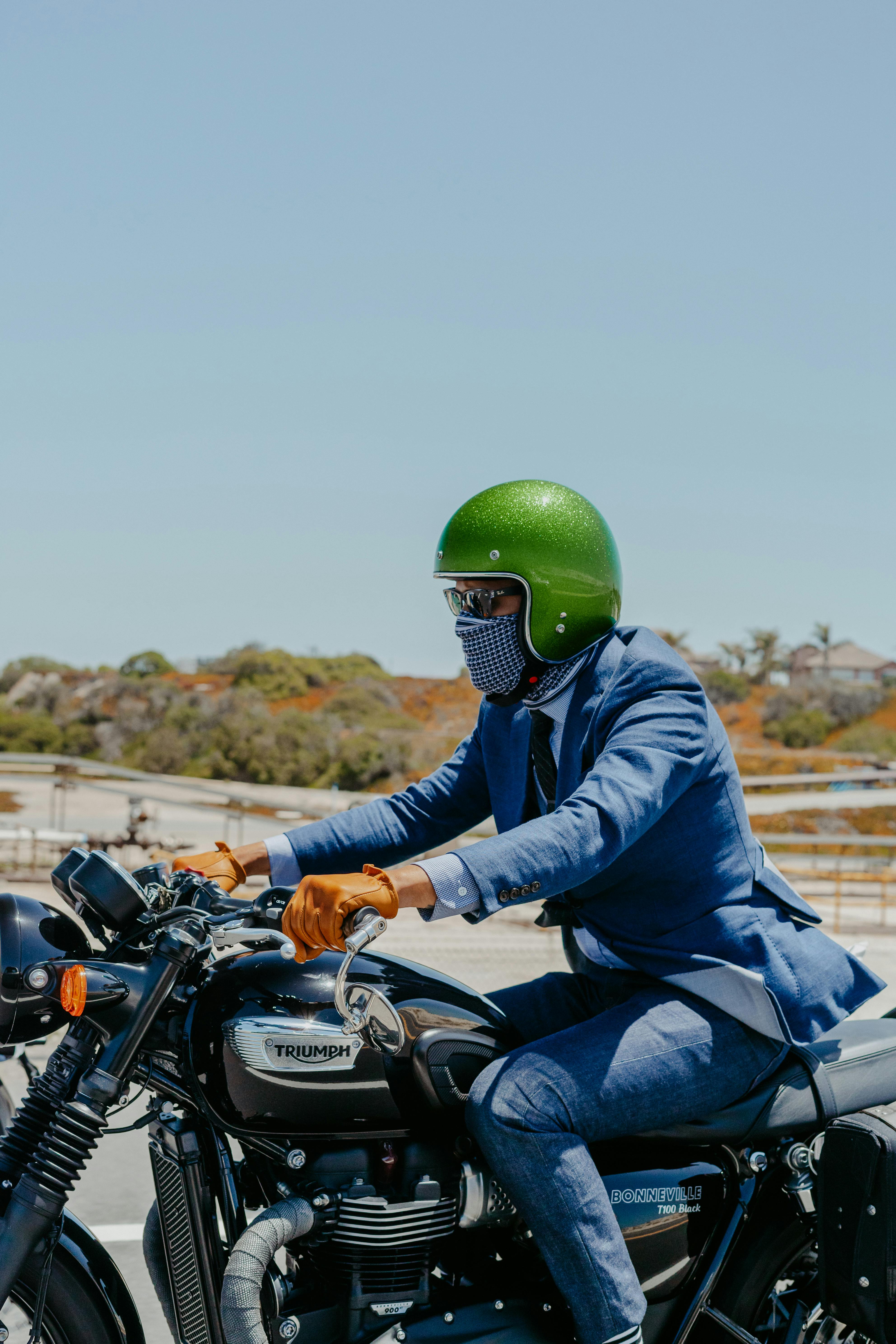 Man in Blue Suit Jacket with Green Helmet Riding on Motorcycle · Free ...