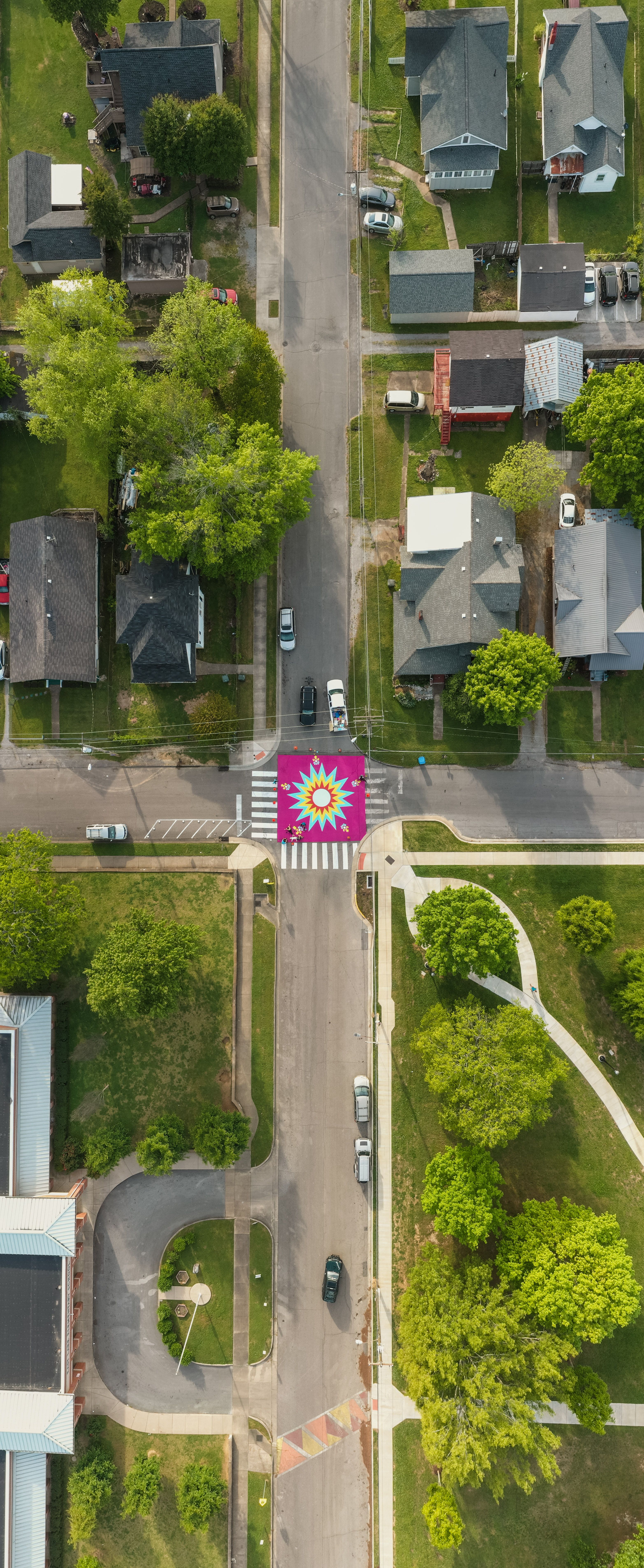 People Painting an Illustration in the Middle of a Junction · Free ...