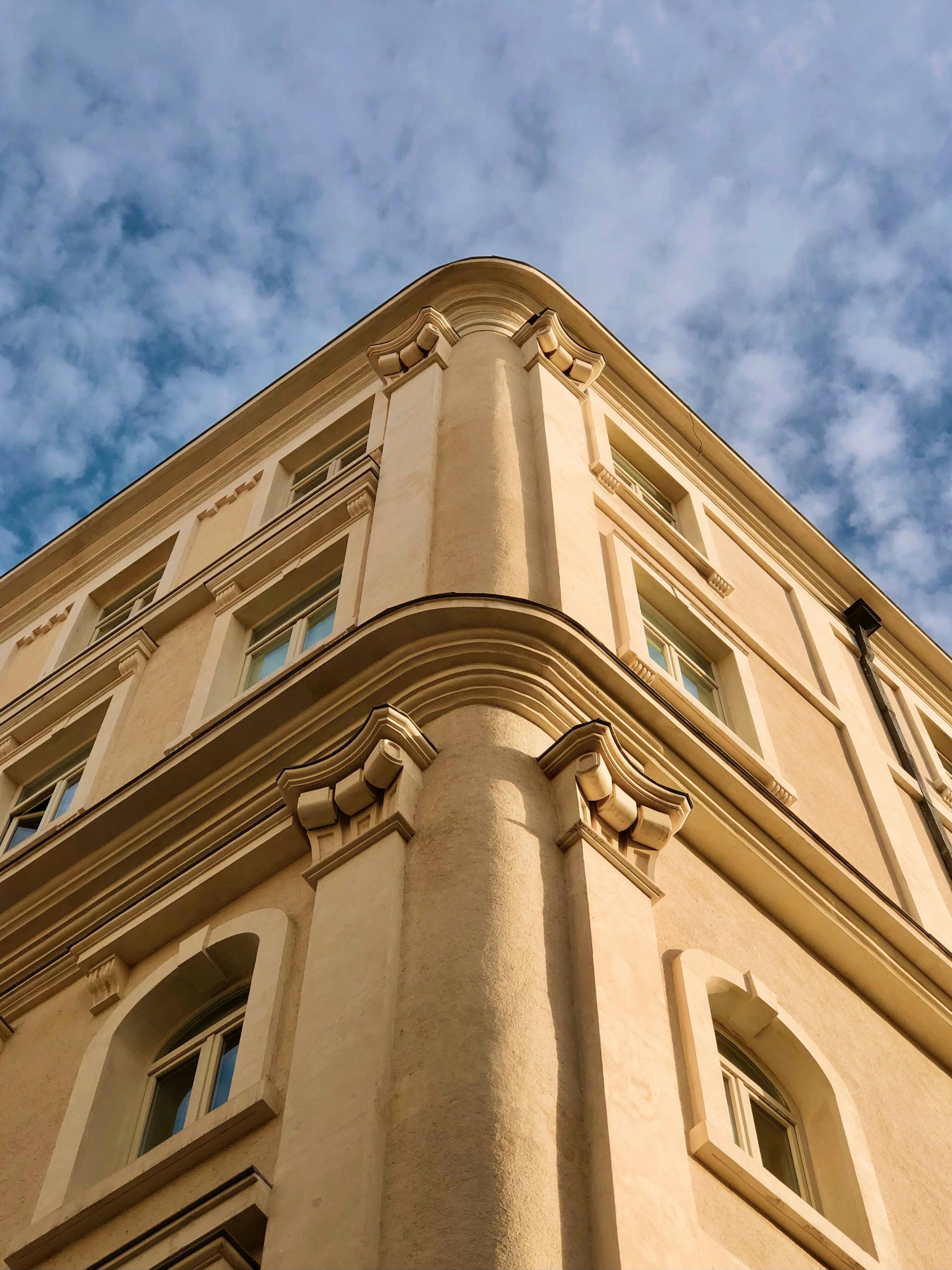 Concrete Wall with Shaded Windows · Free Stock Photo