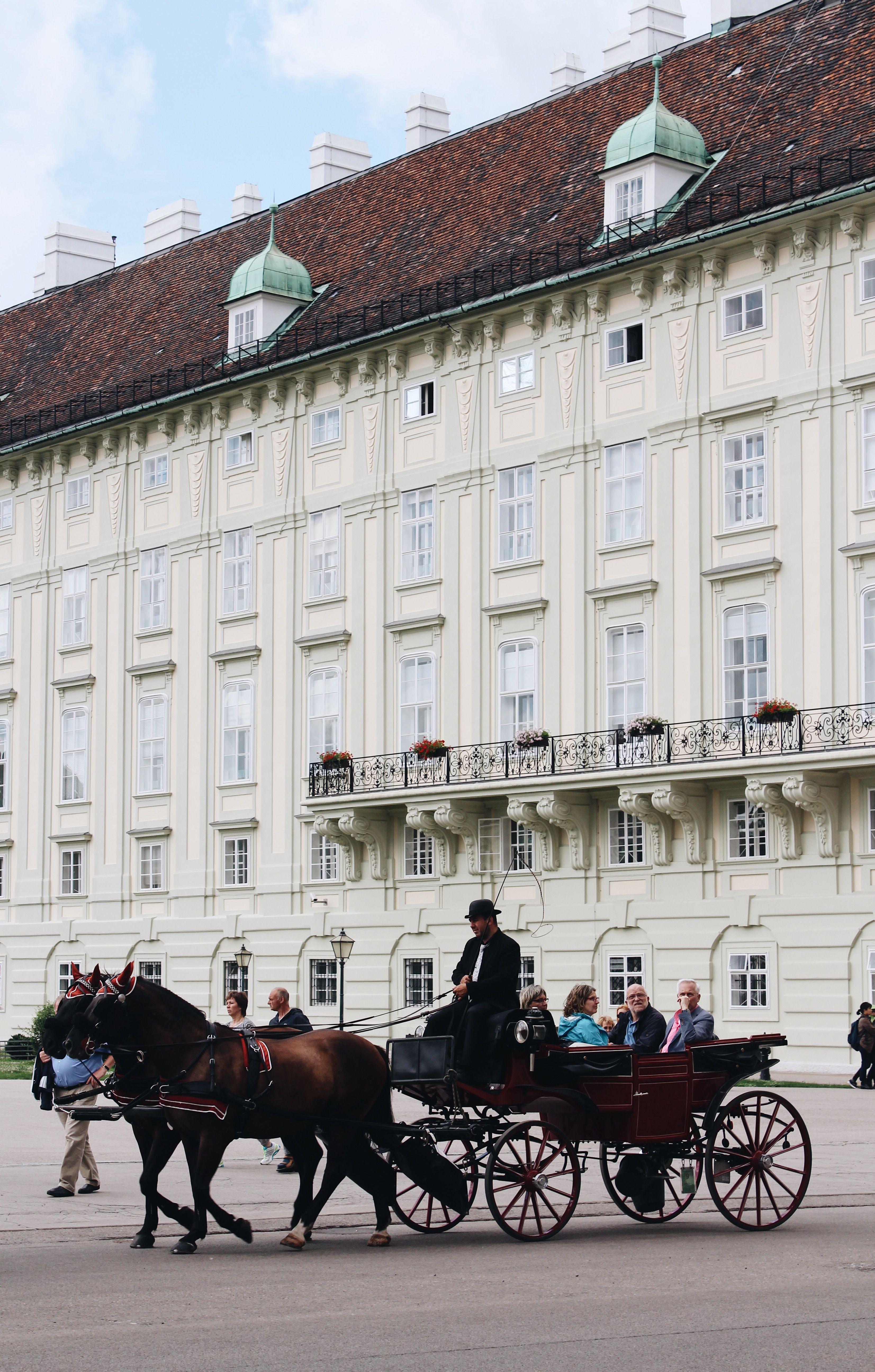 People Riding a Horse Drawn Carriage · Free Stock Photo