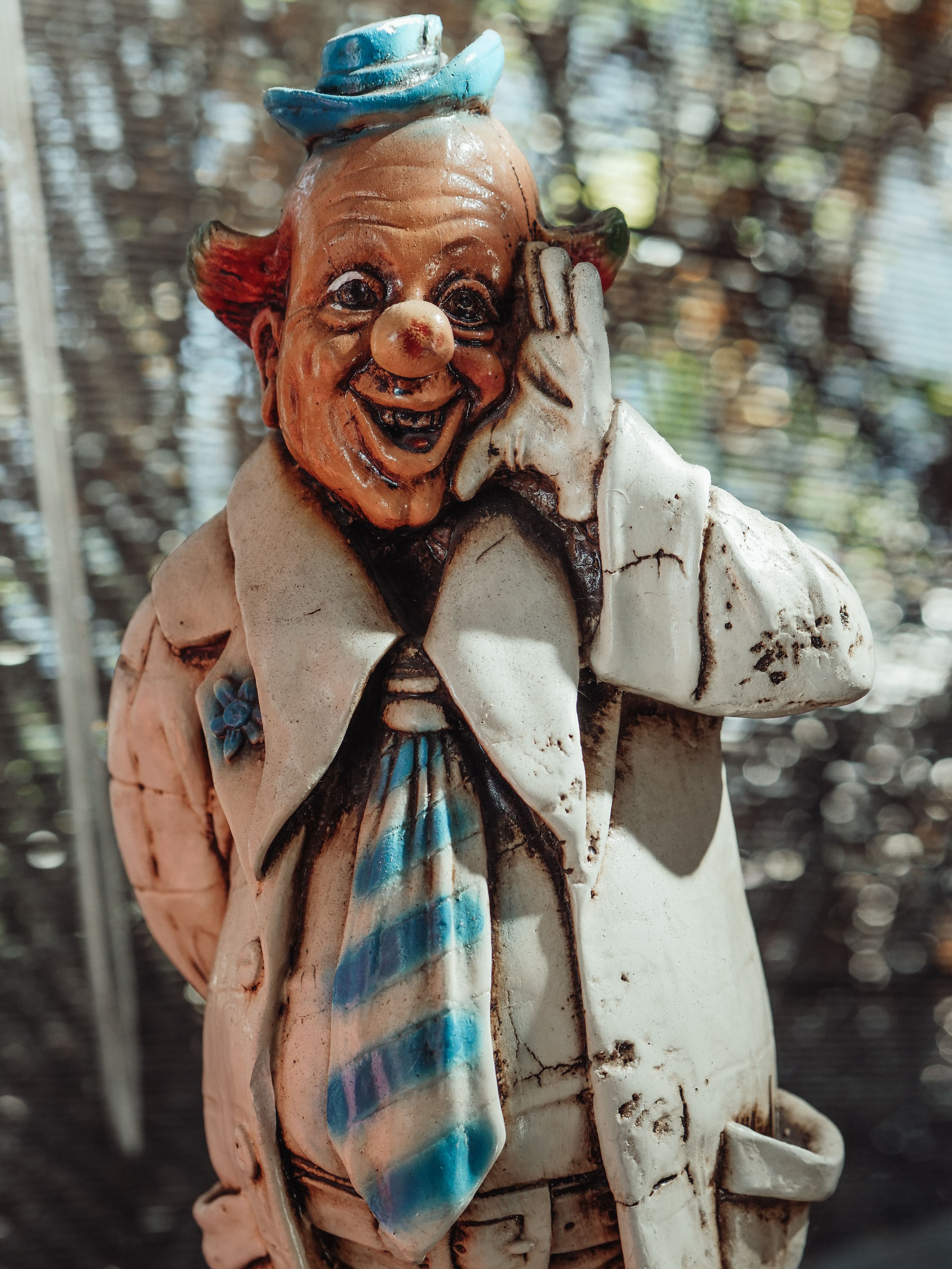A Porcelain Clown Statue · Free Stock Photo