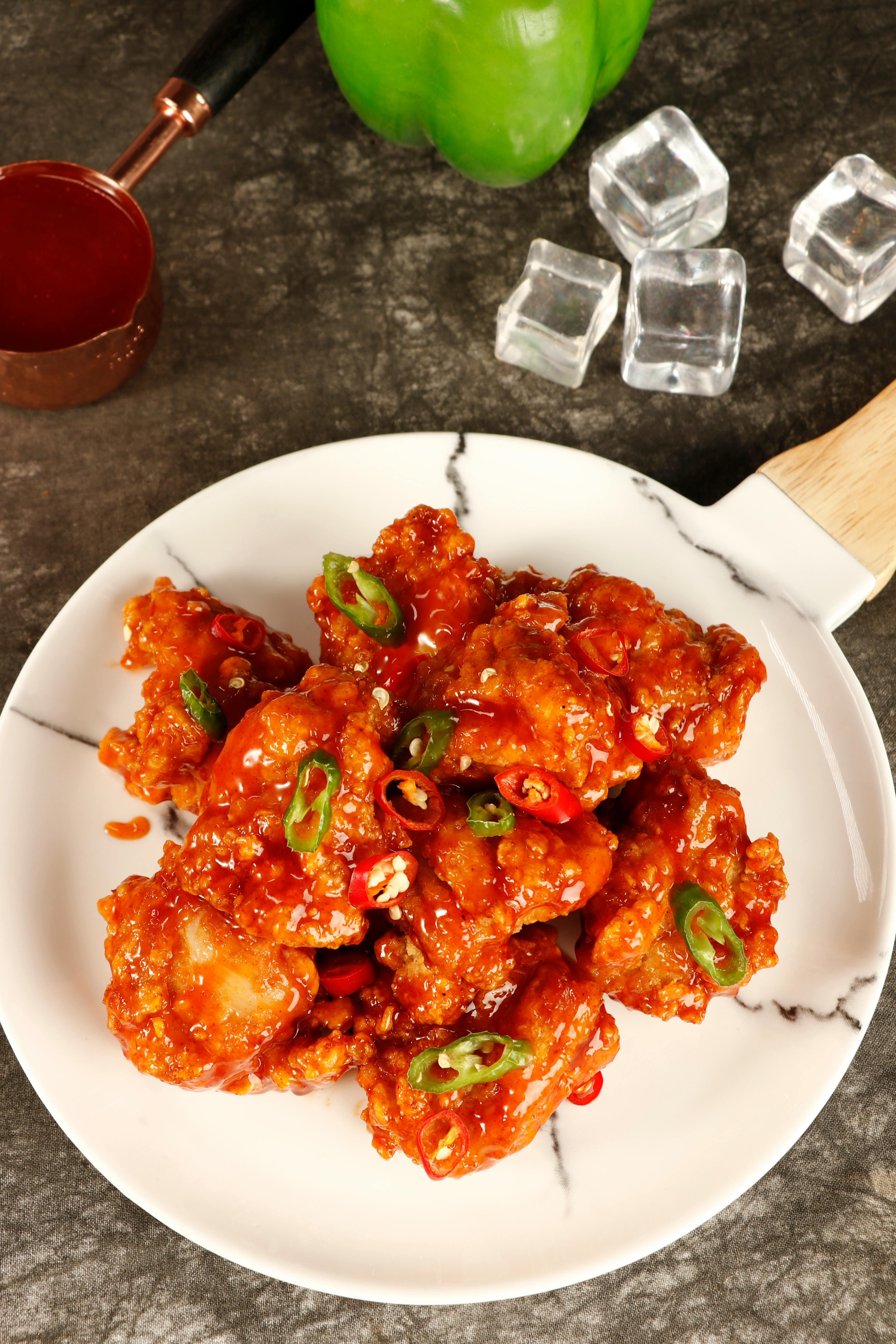 Plate with a Spicy Chicken Dish · Free Stock Photo