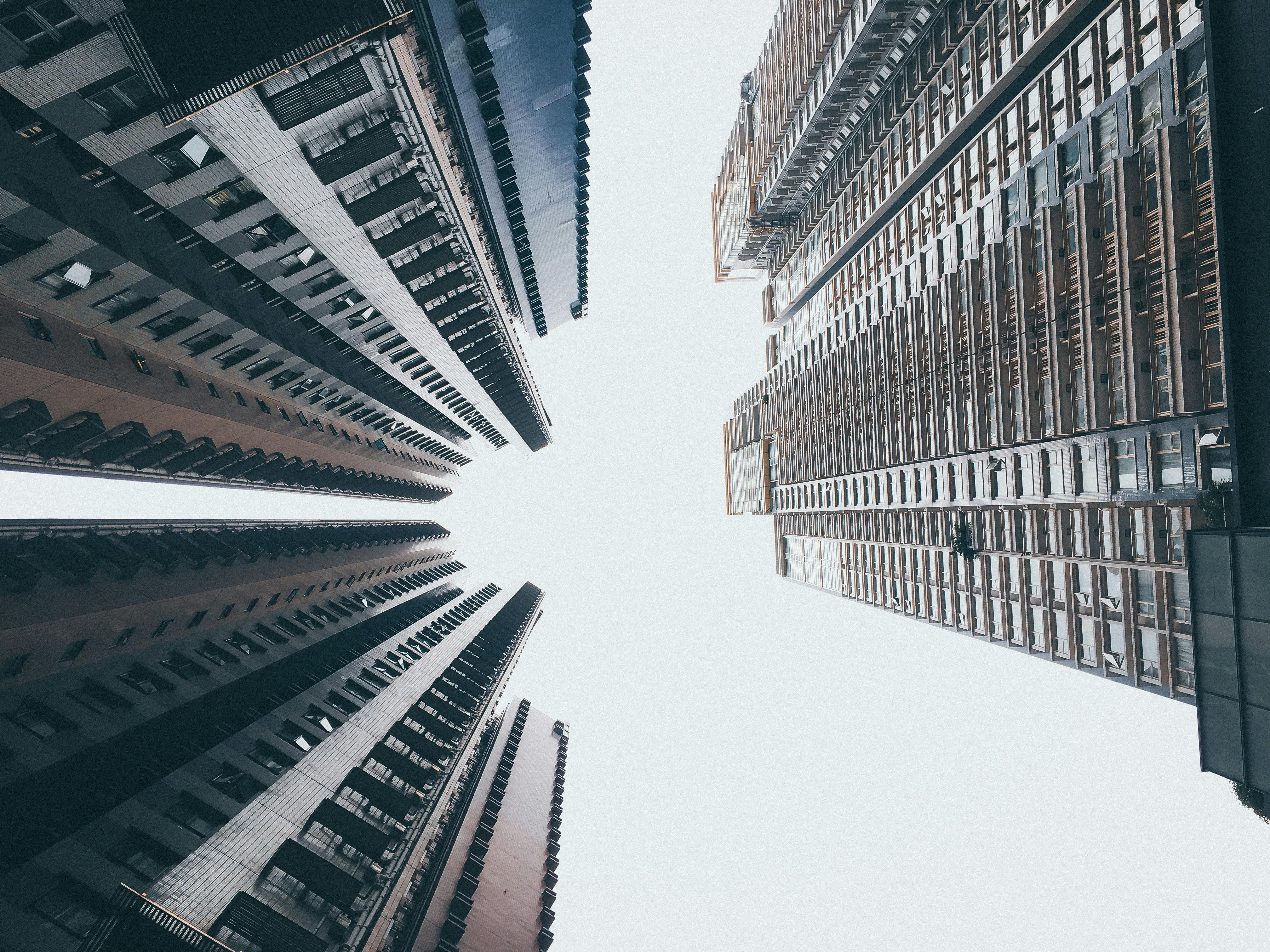 A Low Angle Shot of High Rise Buildings · Free Stock Photo