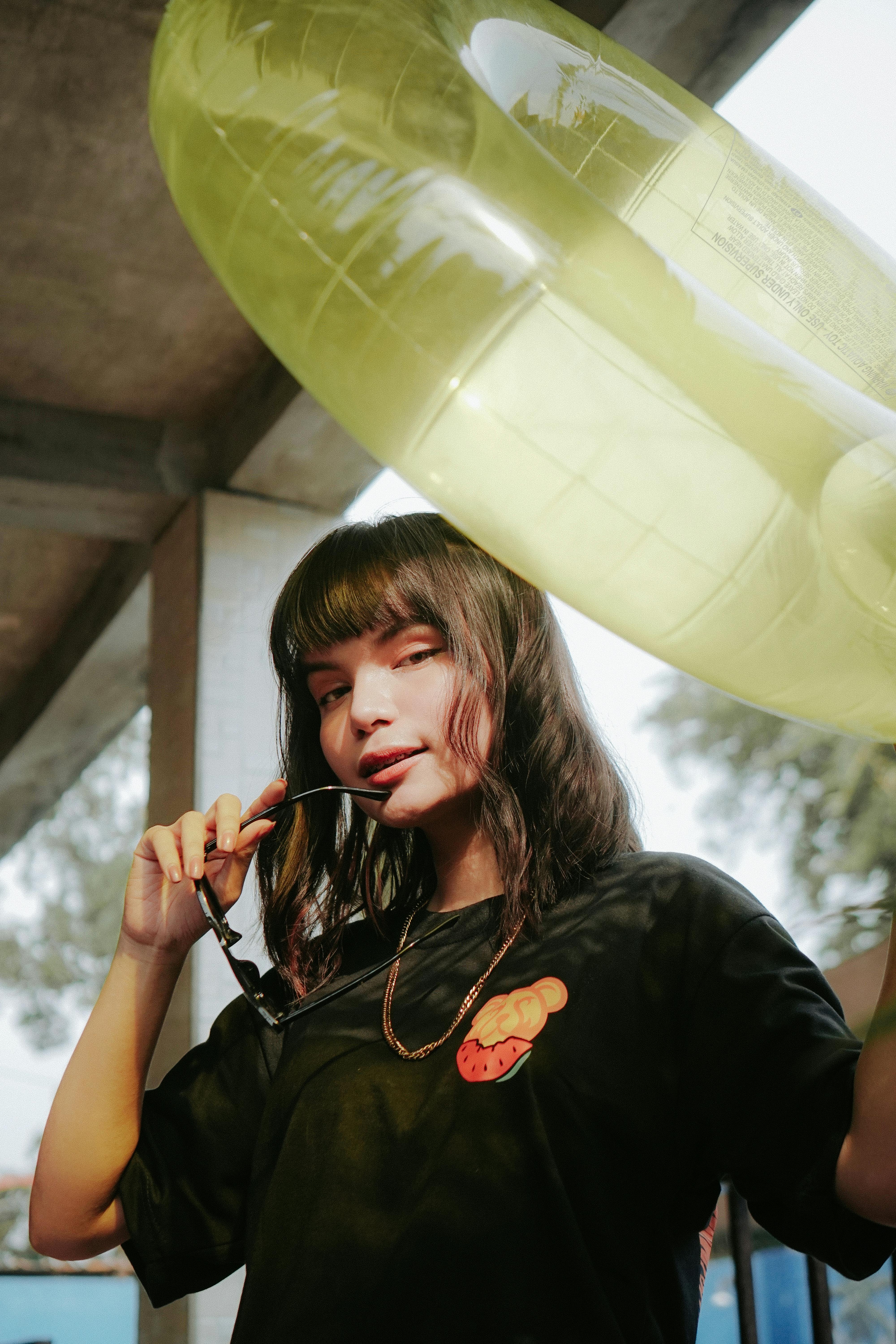 Teenage Girl Holding a Floater · Free Stock Photo
