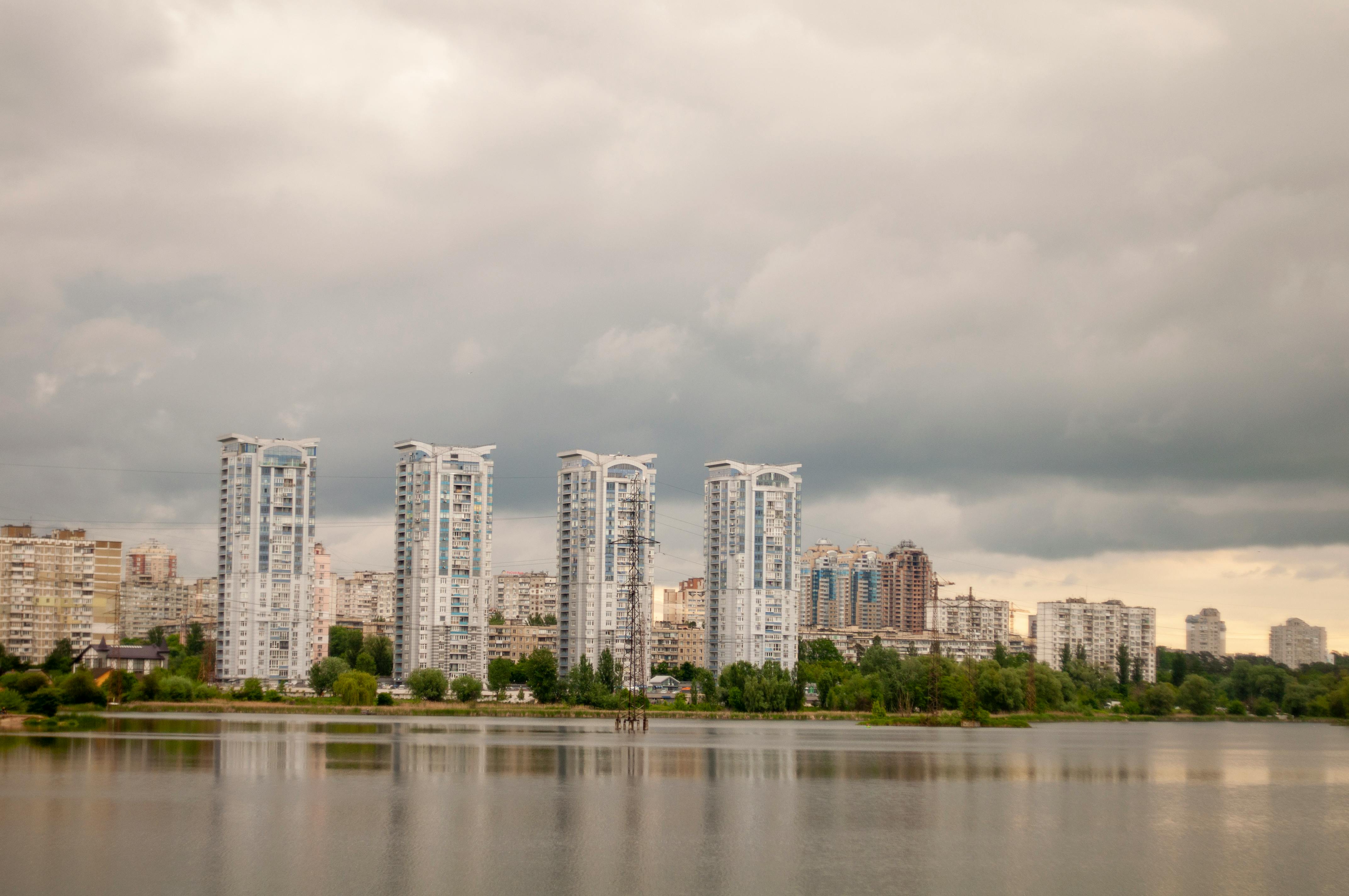 Buildings Under Cloudy Sky · Free Stock Photo